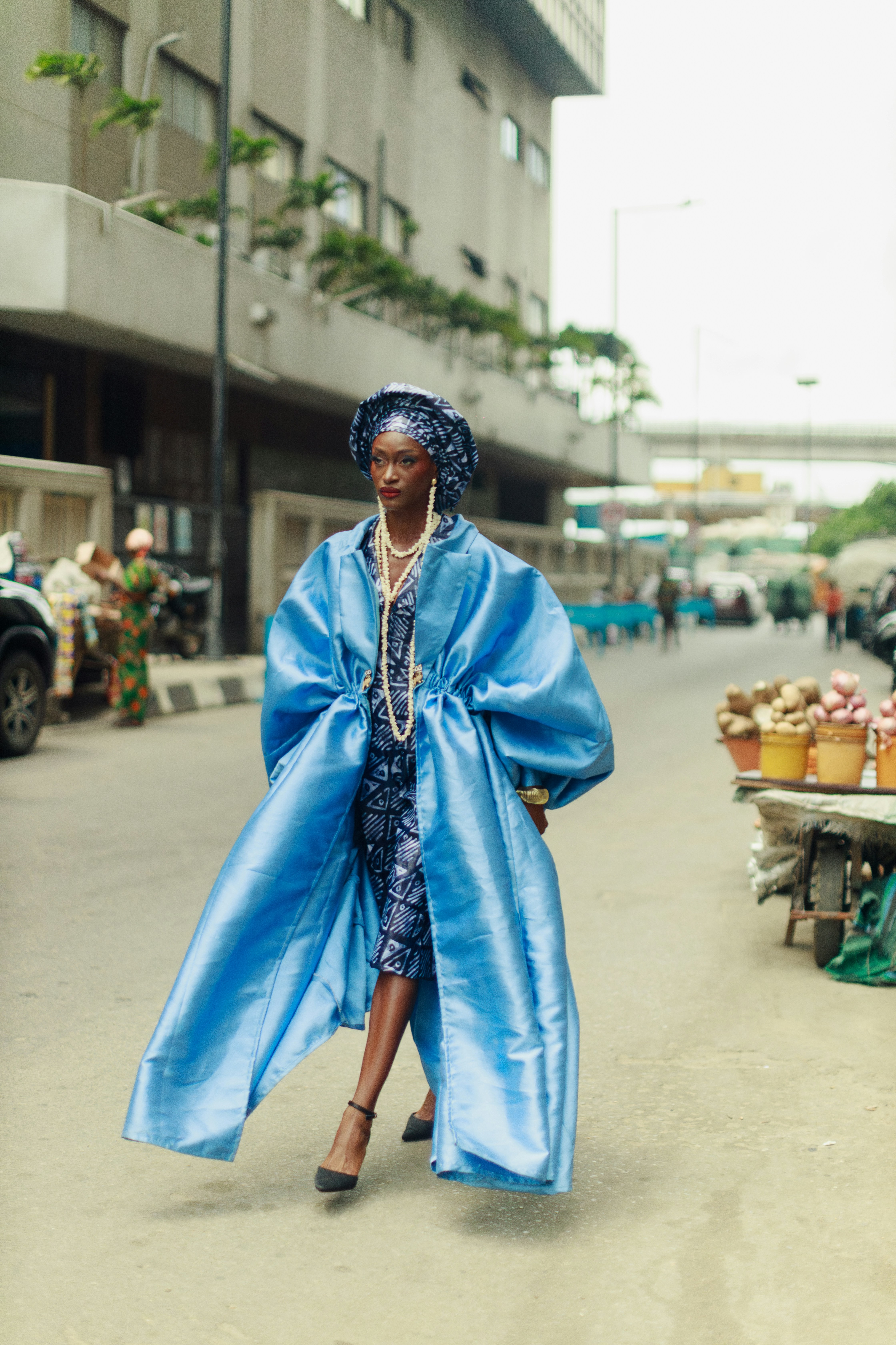 Azure Elegance on the Street: A Bold Blue Gown Stirs the Lagos Morning