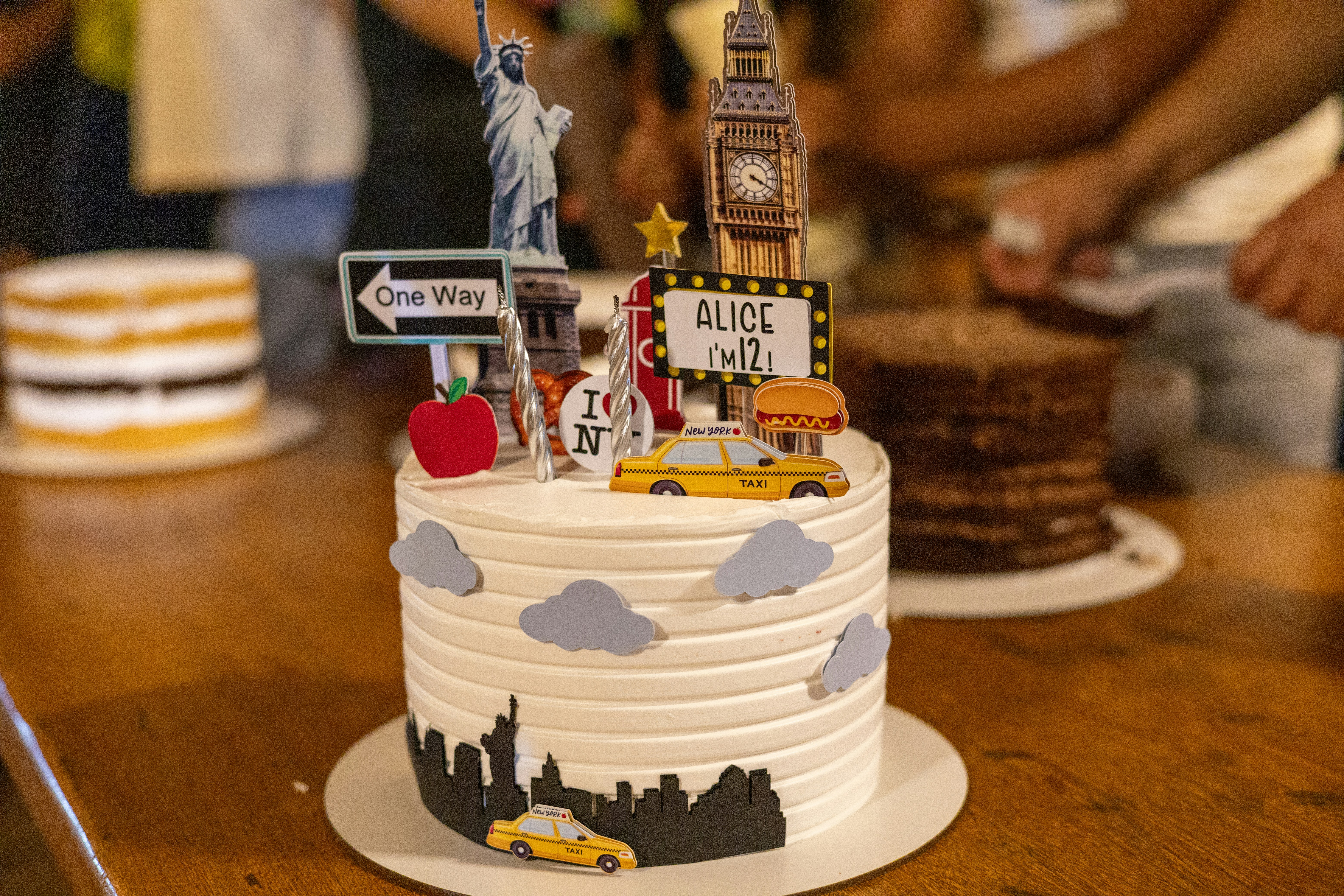 Miniature NYC Meets Birthday Cake: A Whimsical Cityscape Topper