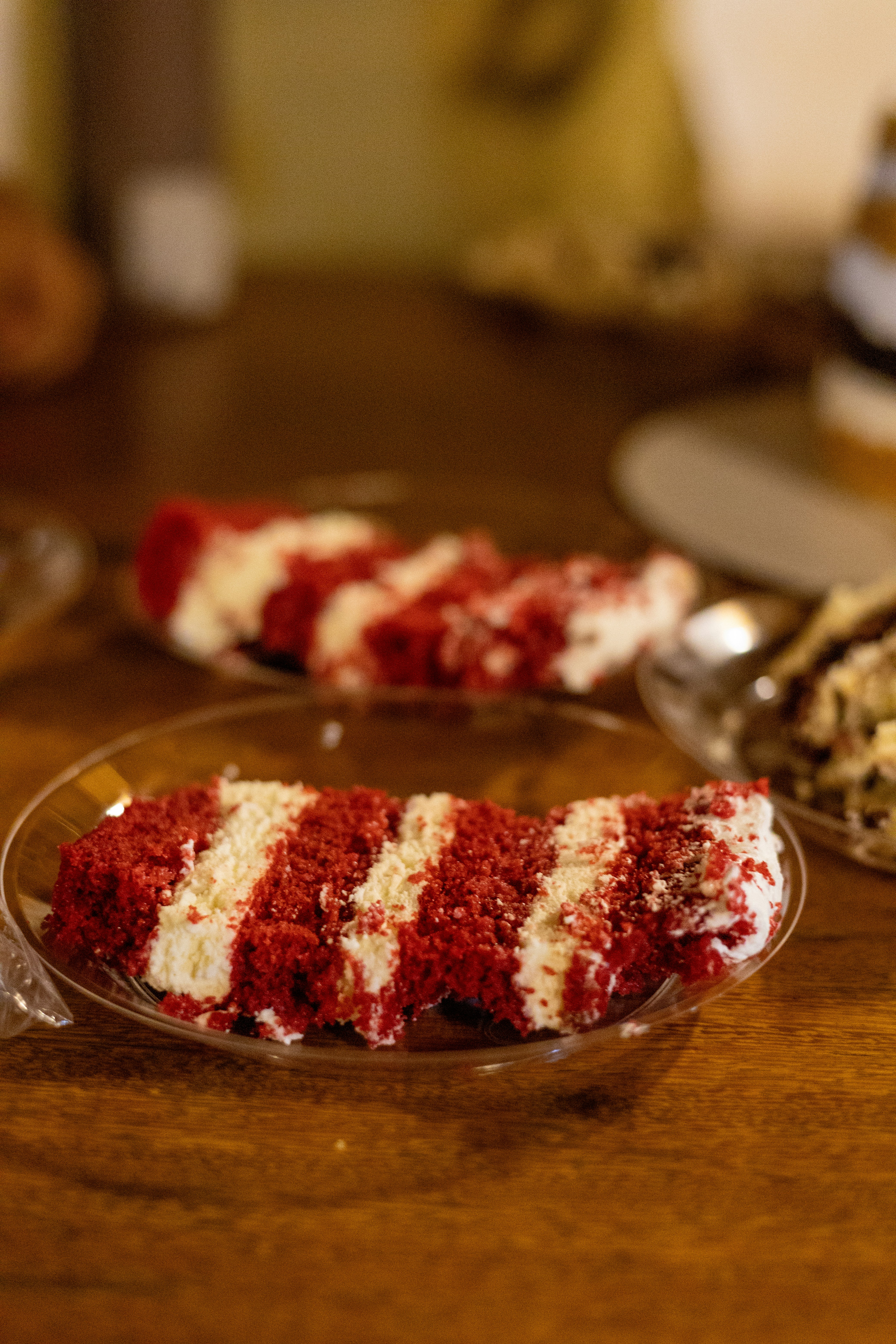 Red Velvet Cake Slice on a Wooden Table