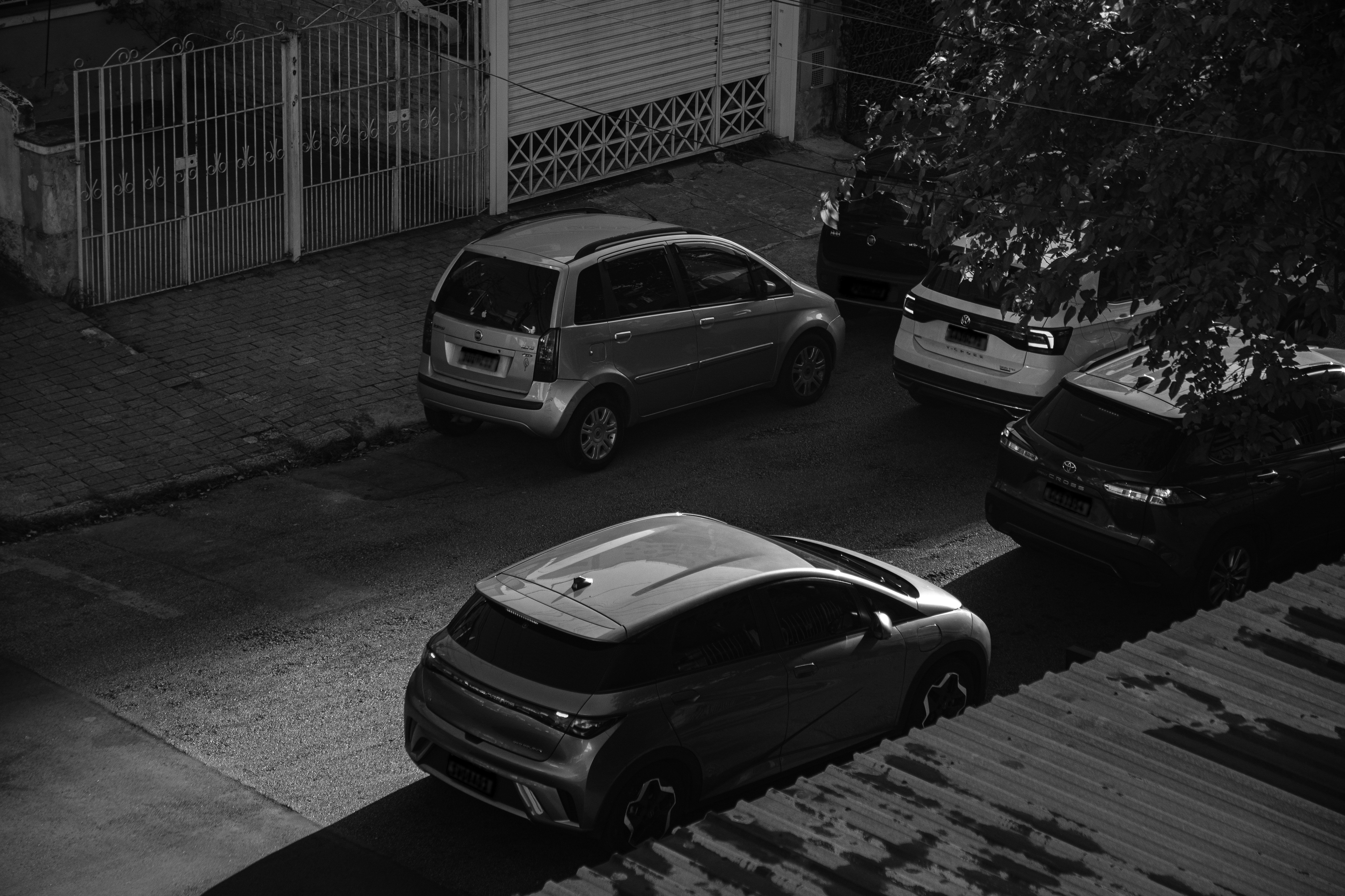 Dark Street Quartet: Parked Cars in Quiet Urban Night