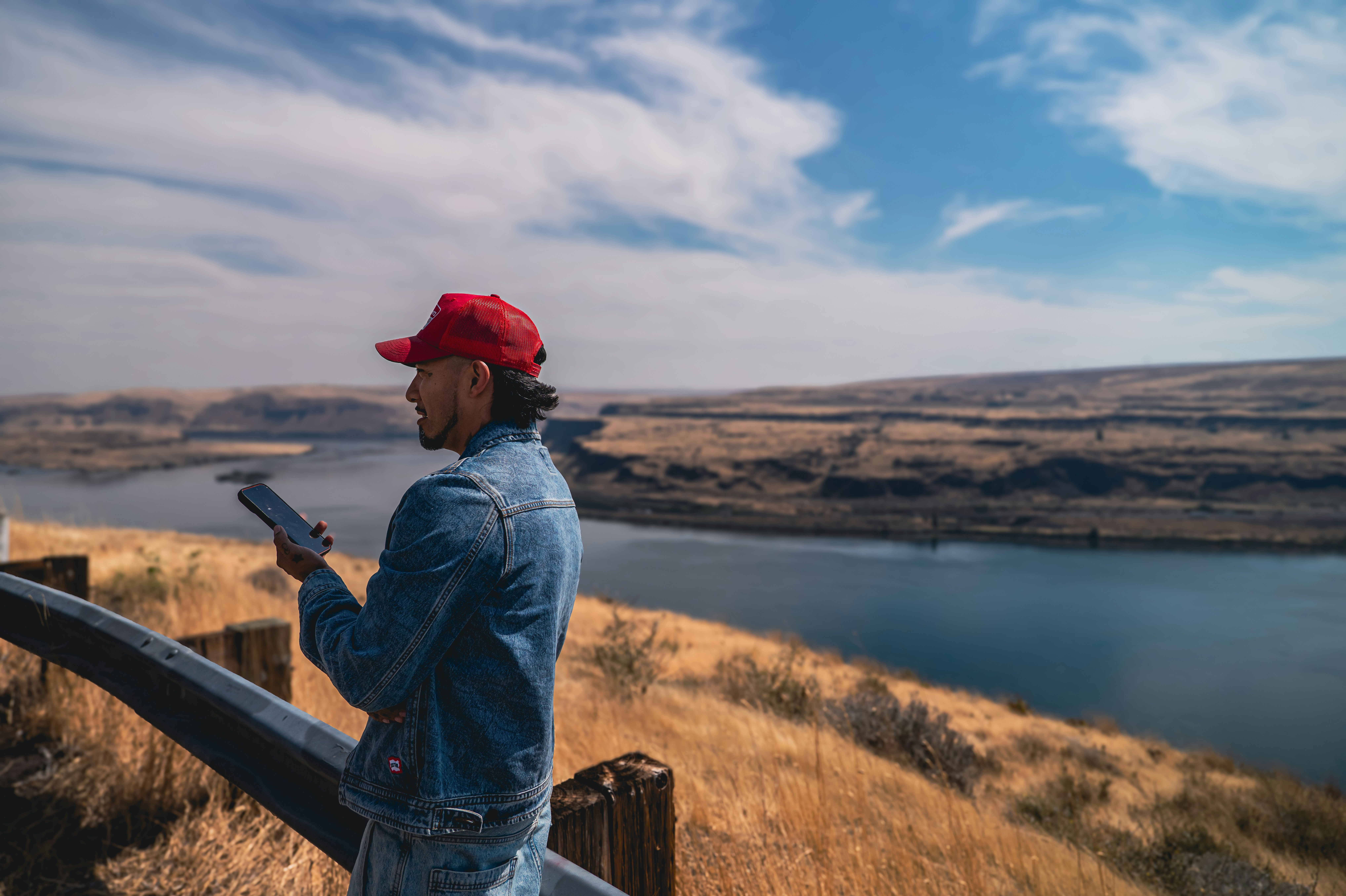 Red Cap, Blue Denim and a Lakeward Horizon
