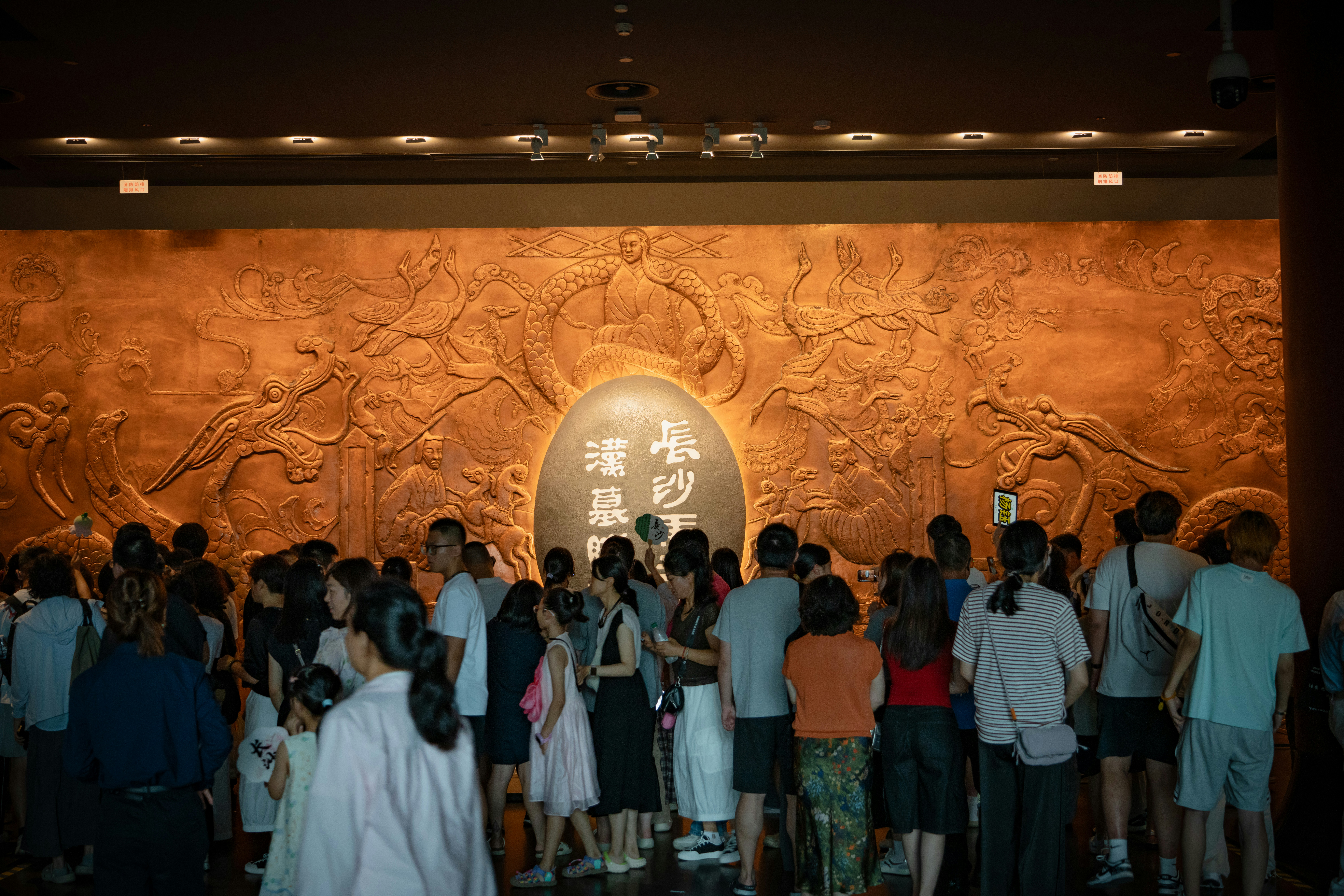 Ceremonial Relief Gallery: A Quiet Pause Amid the Crowd
