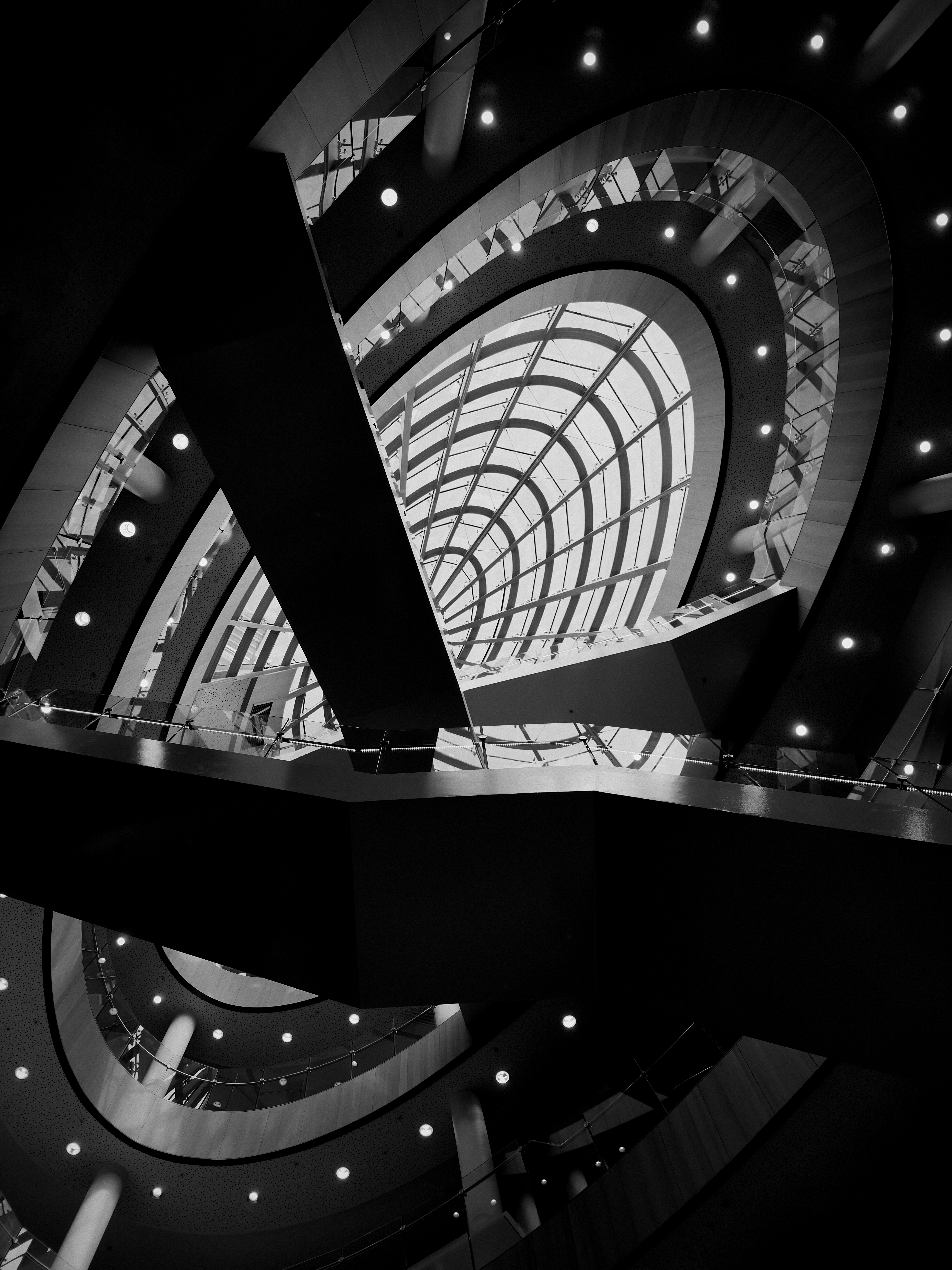 Spiral Atrium: Monochrome Geometry of Circles and Beams