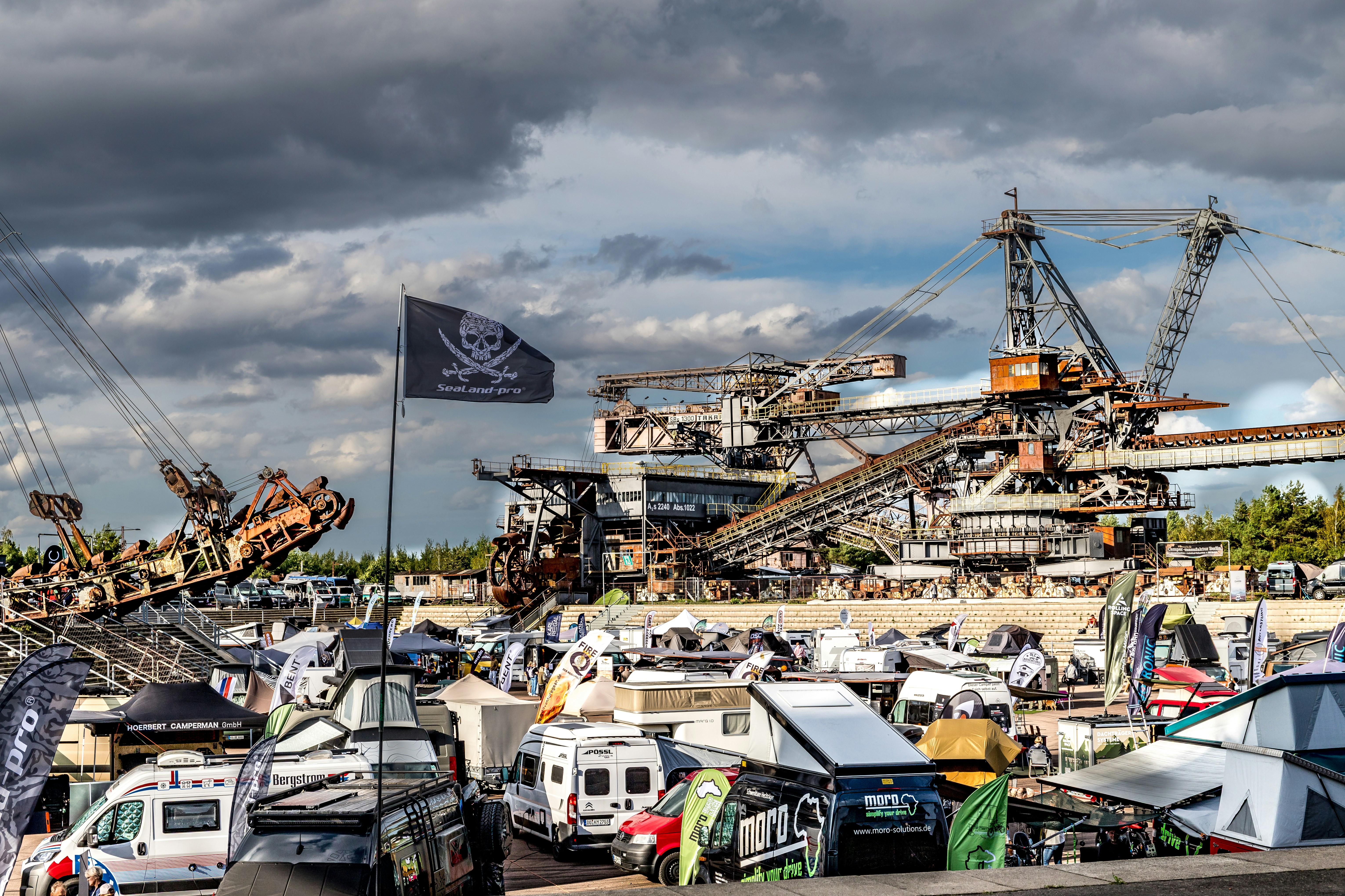Industrial Docks Under Rotating Machinery and Flags