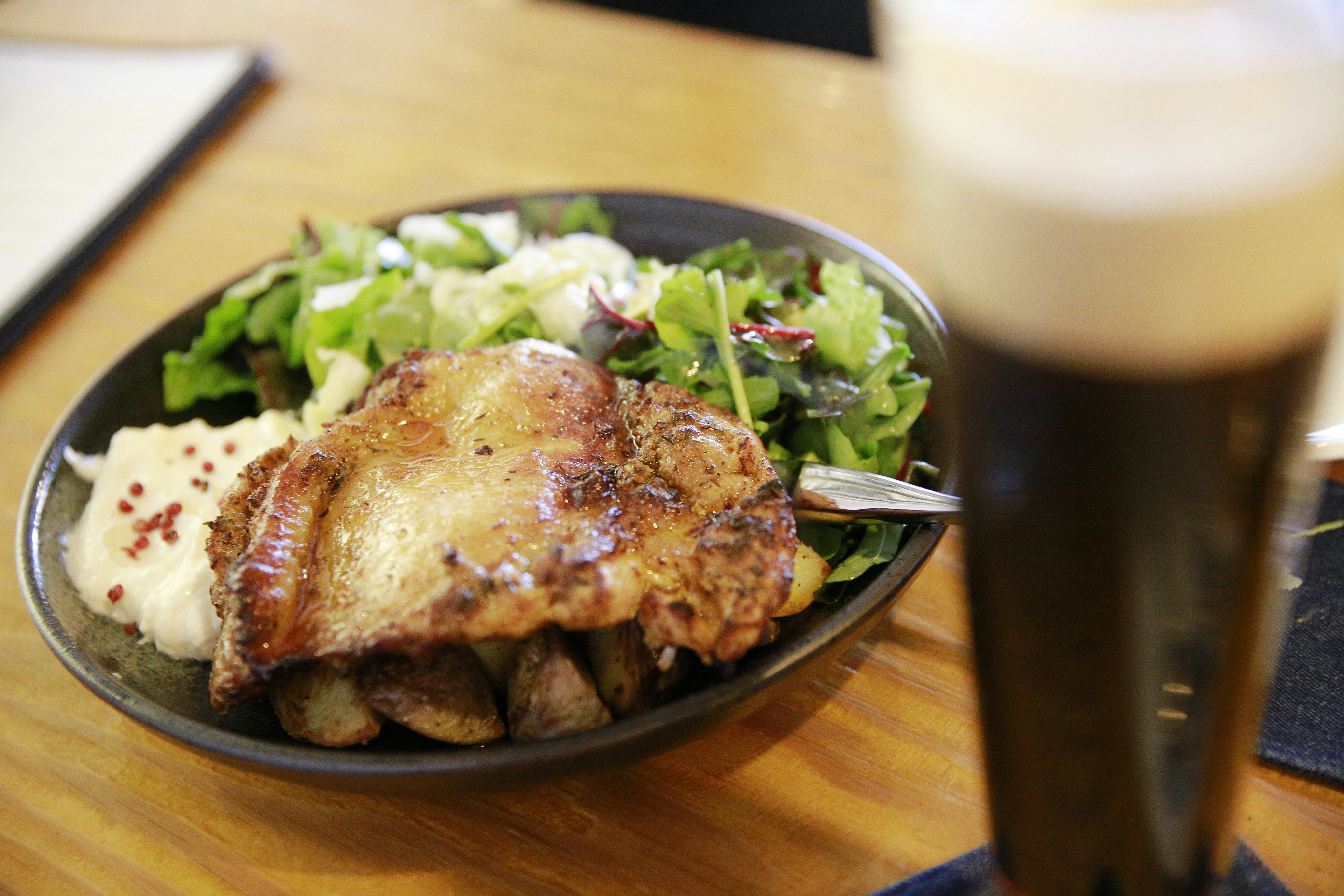 Grilled Pork Bowl with Greens and a Foamy Pint