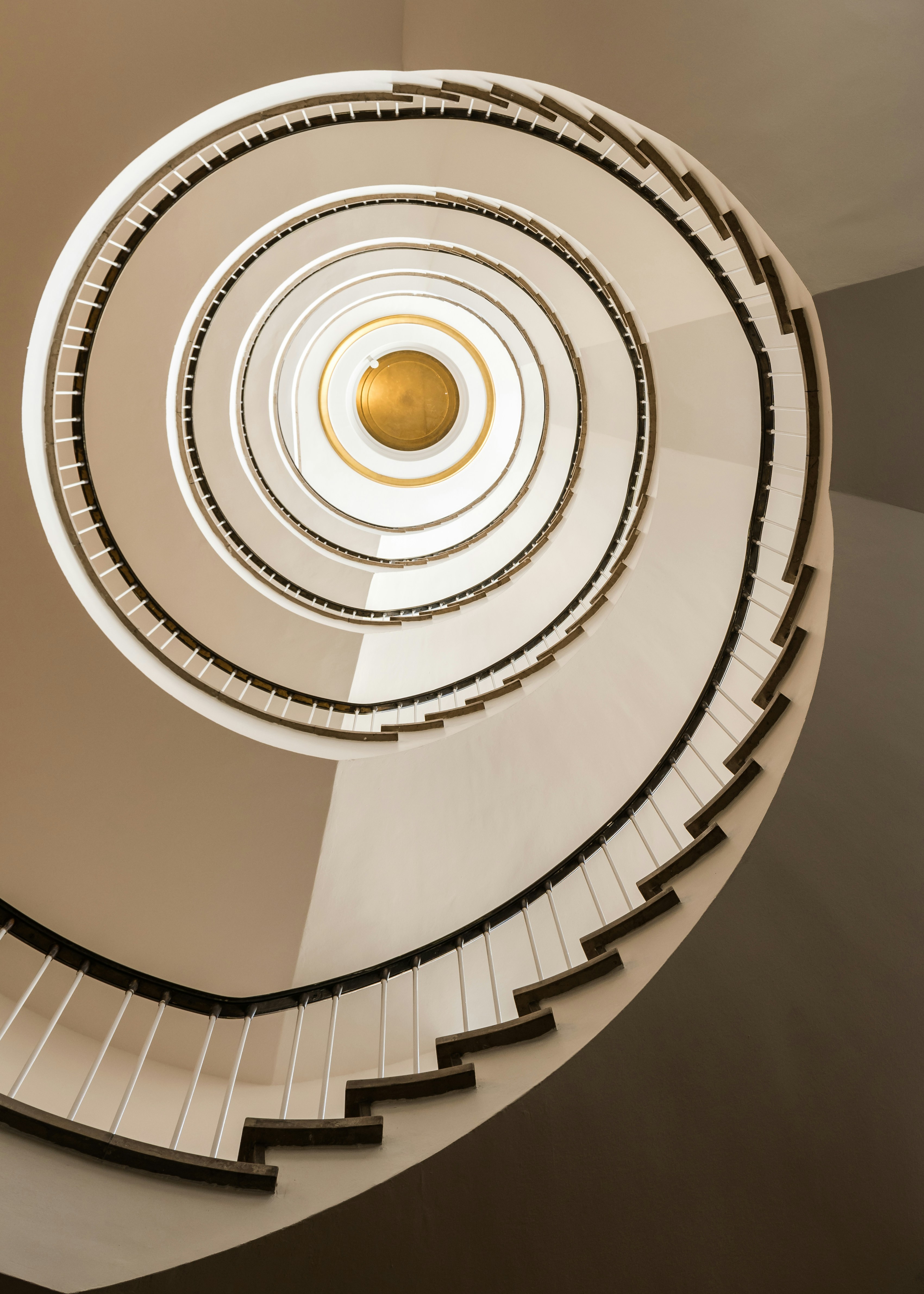 Spiral Descent: A Minimalist Staircase Tunnel to the Core