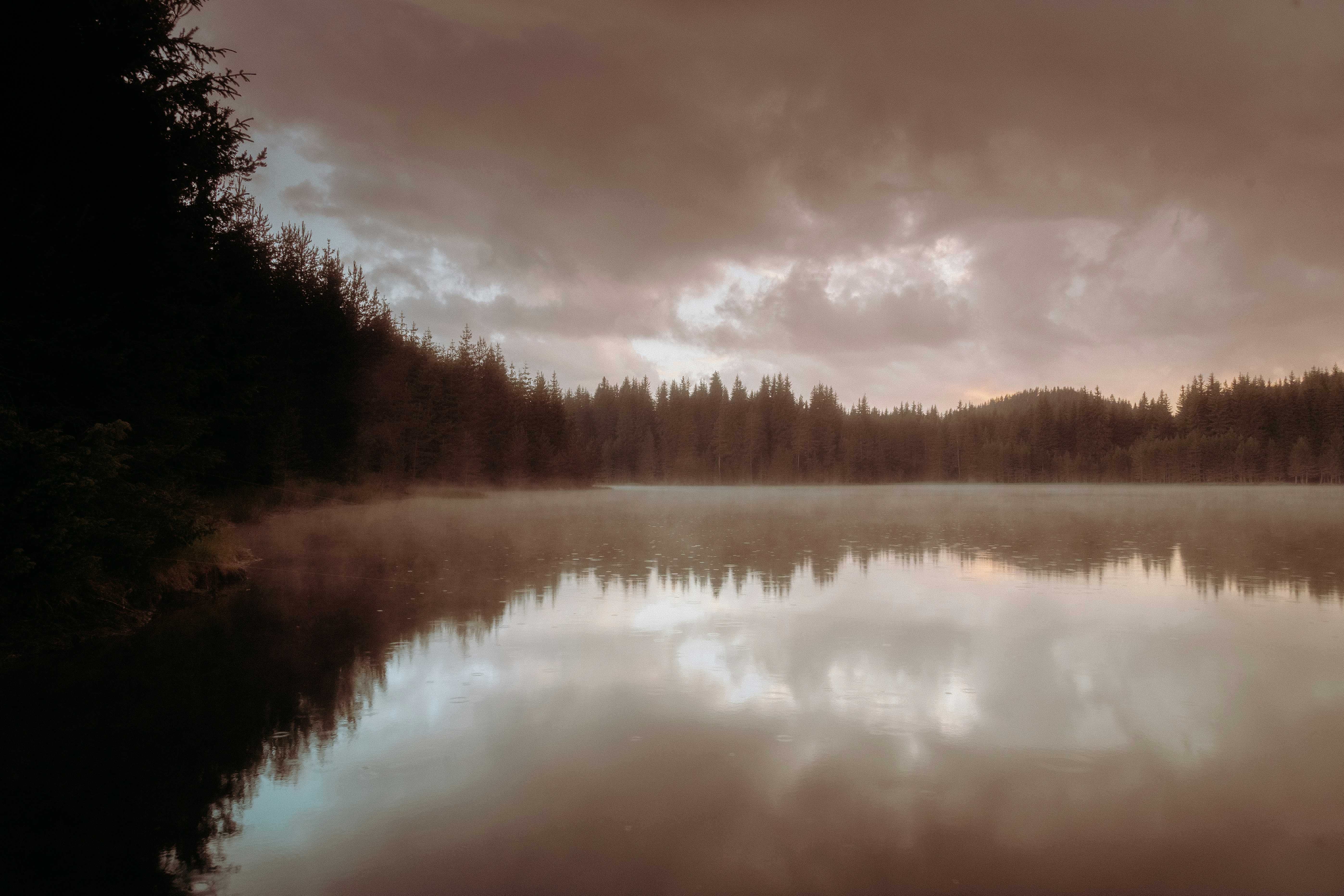 Silent Dawn over Mist-Washed Lake