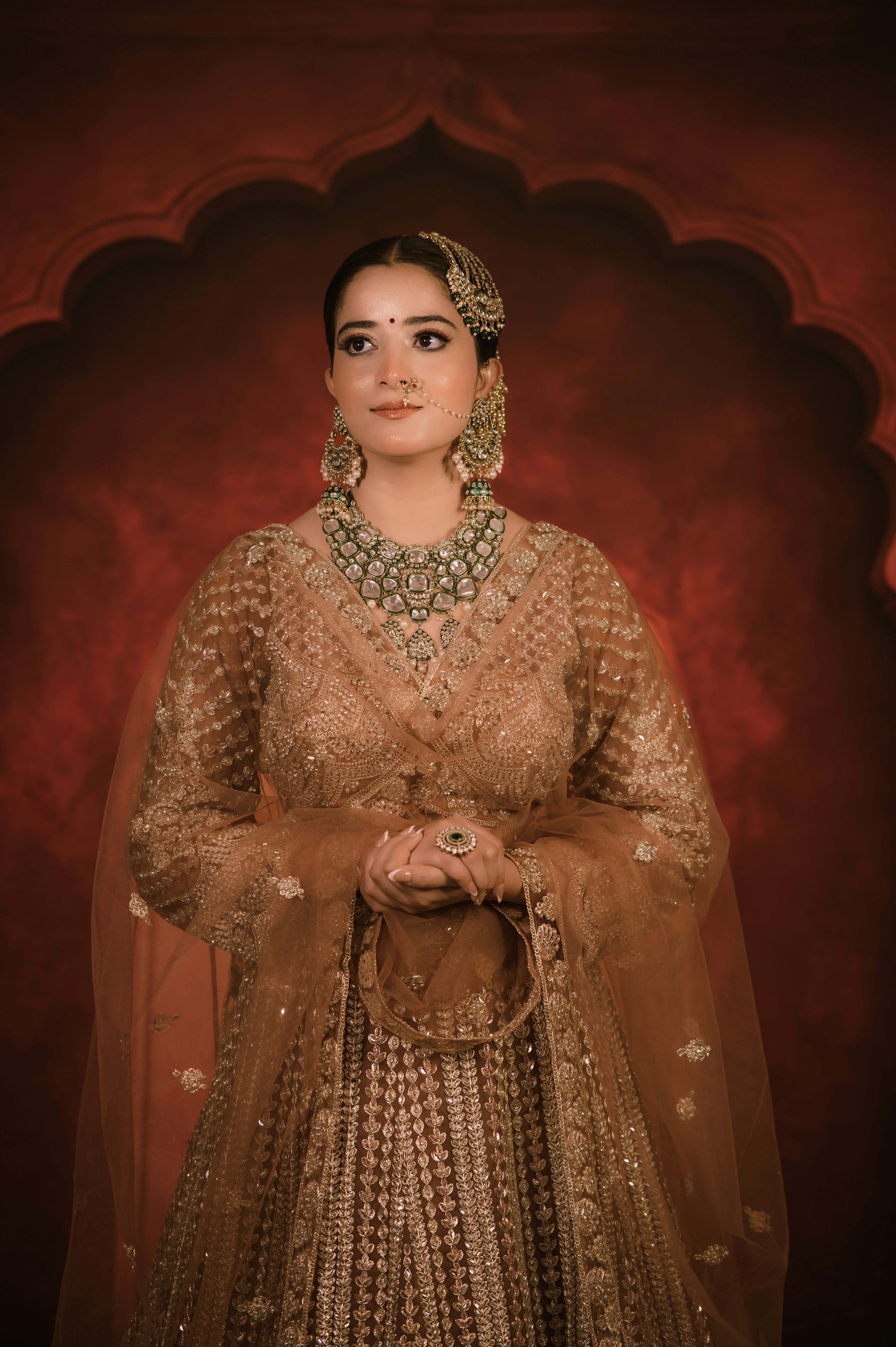Regal Adornment: A Bride in Golden Town Heritage Attire