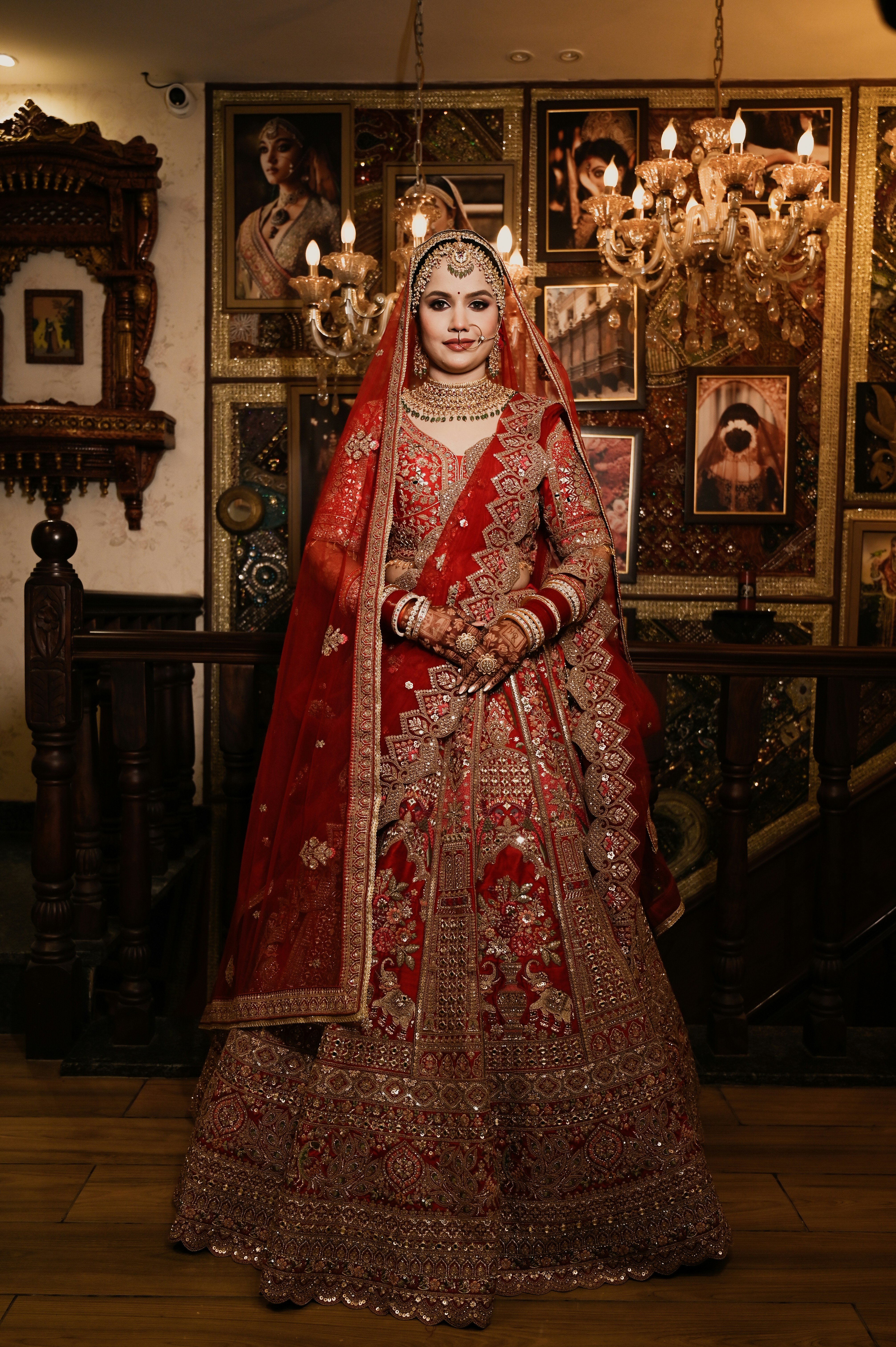 Regal Bride in Crimson and Gold: A Moment of Traditional Splendor