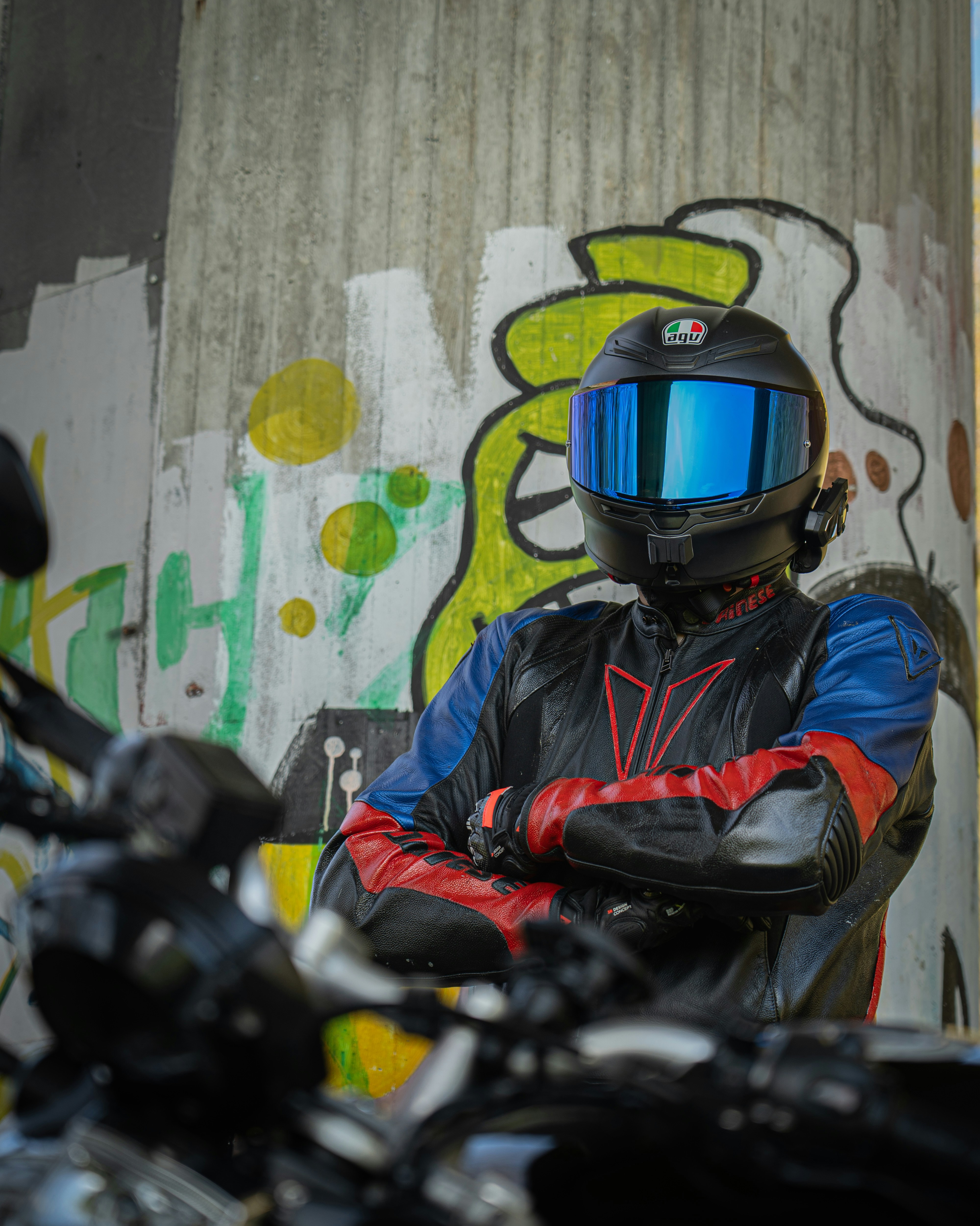 Motorcycle Guardian: Rider in Front of Graffiti Wall