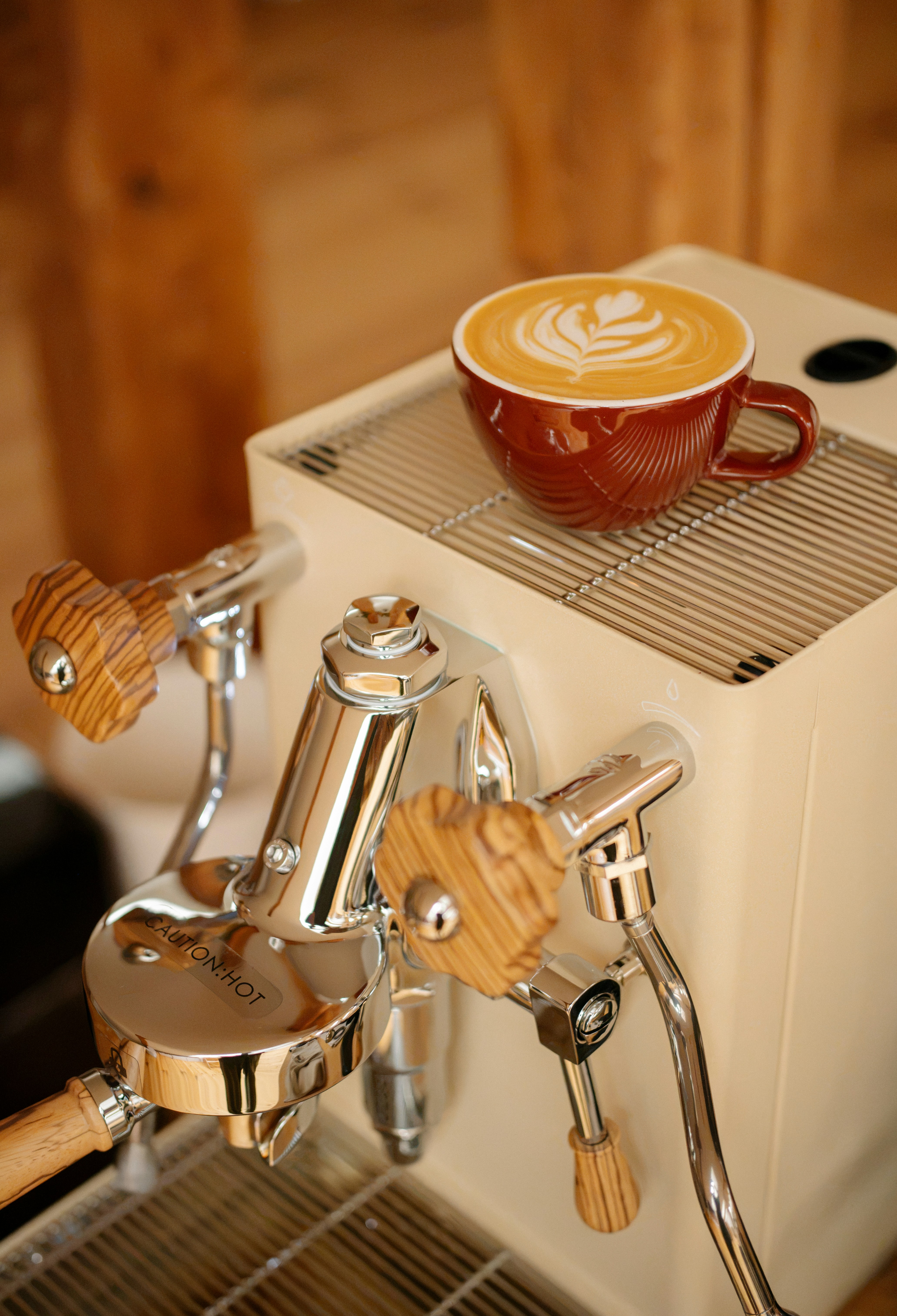 Espresso Craft: A Latte Art Moment on a Vintage-Style Machine
