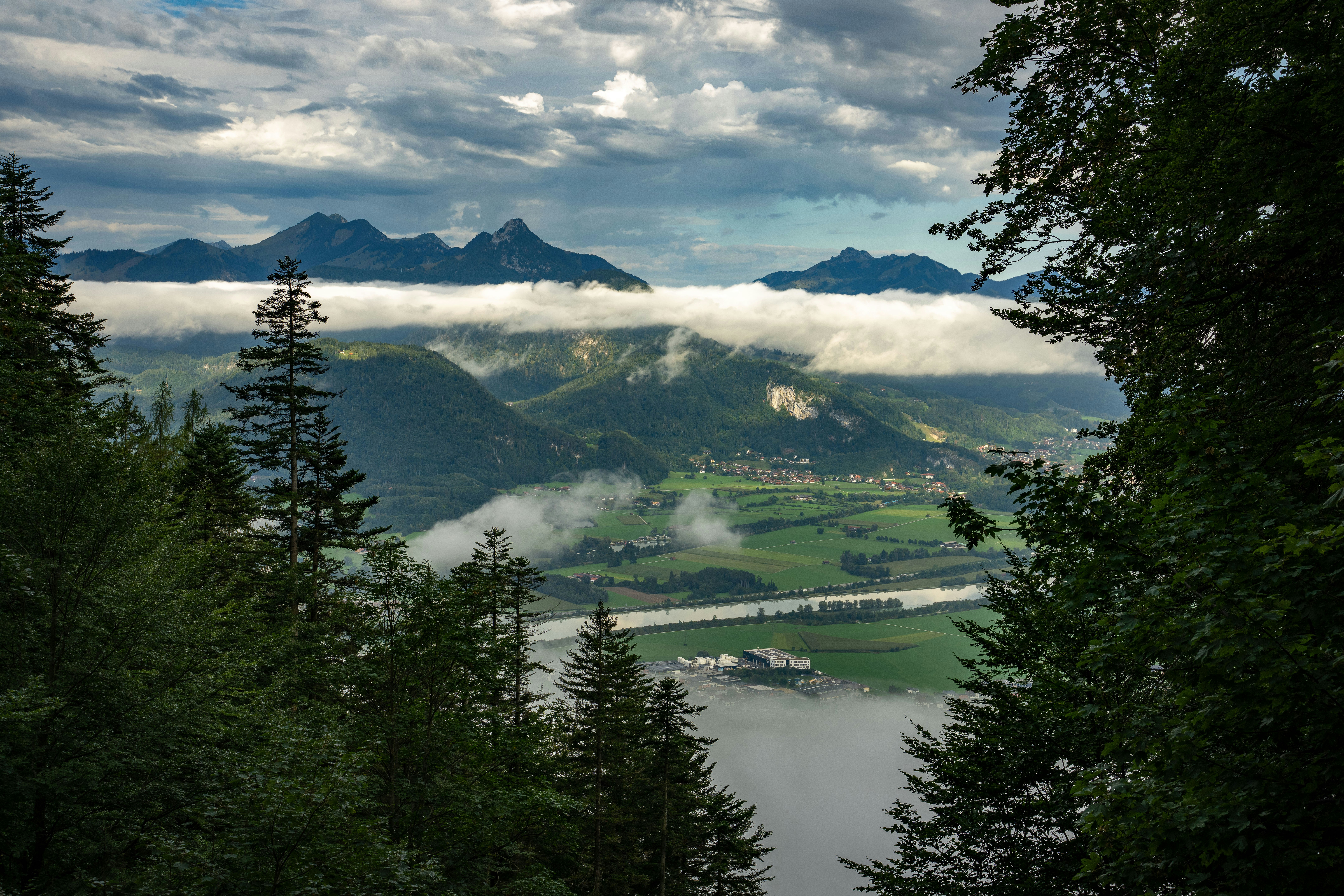 Valley Veil: A Mountain Corridor Stitched in Clouds