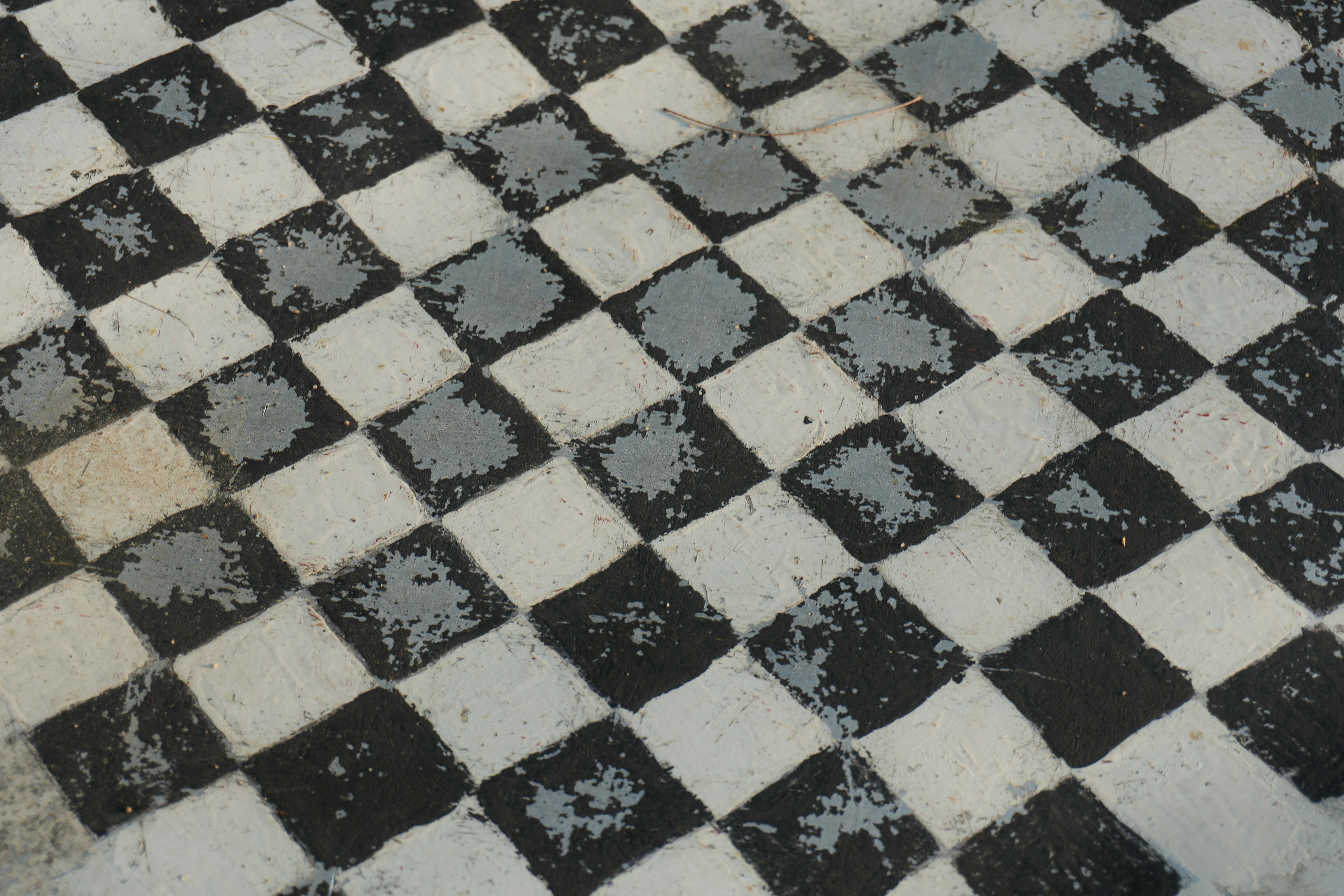 A Worn Checkerboard Floor: Hints of Time on Ceramic Tiles
