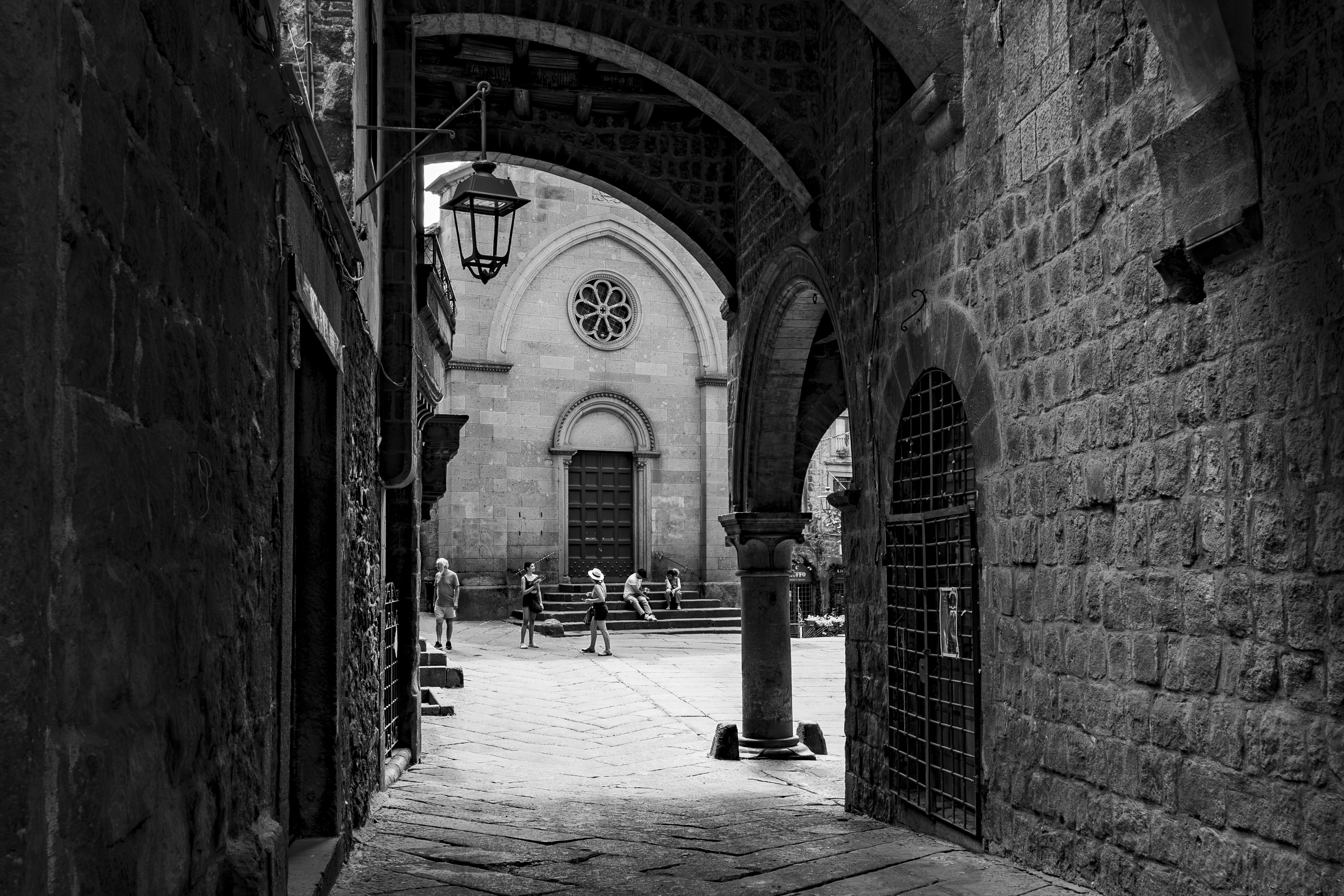 Clay-arched Courtyard: Light Filters Through a Medieval Corridor