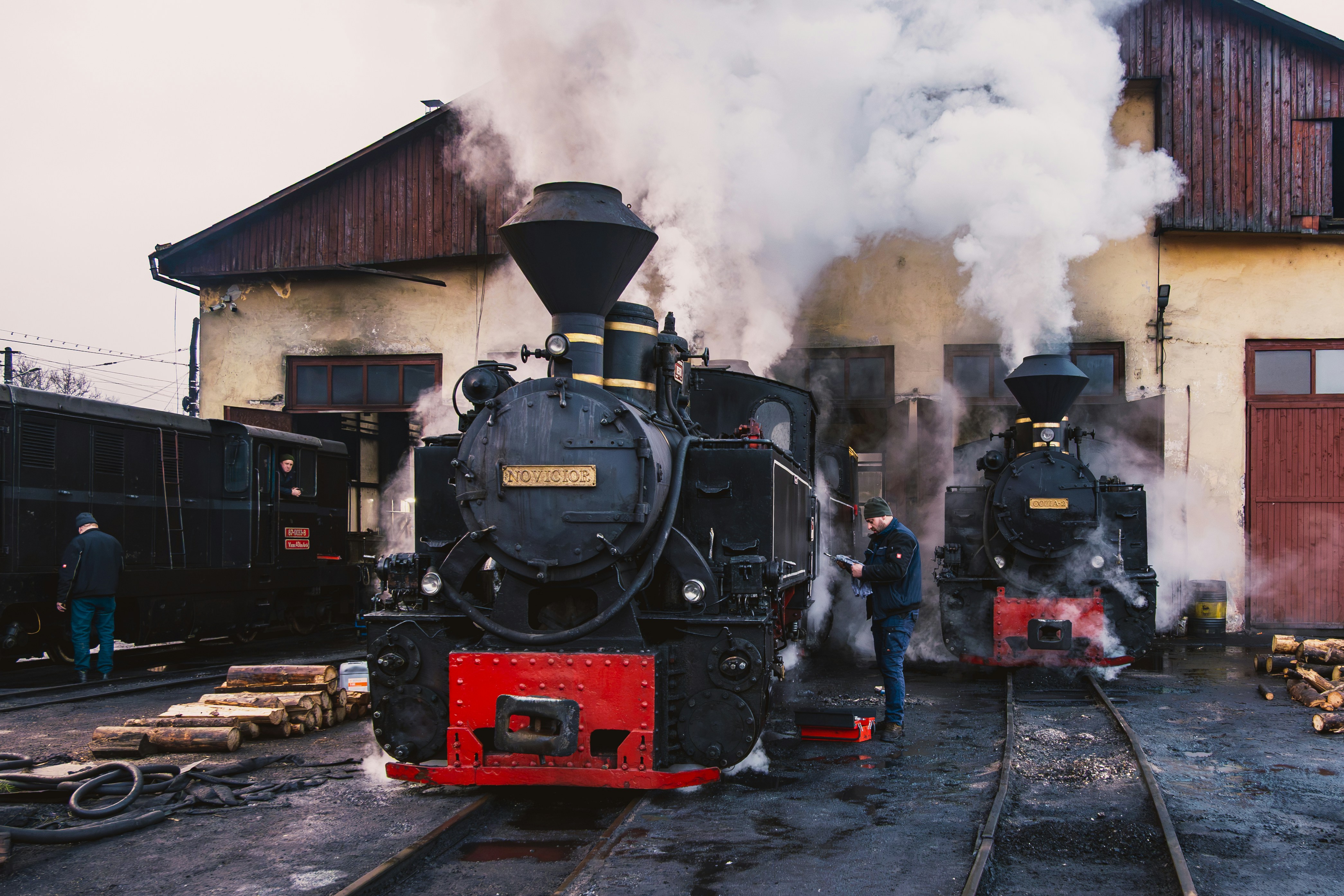 Steam and Steel: Dual Locomotives at the Yard