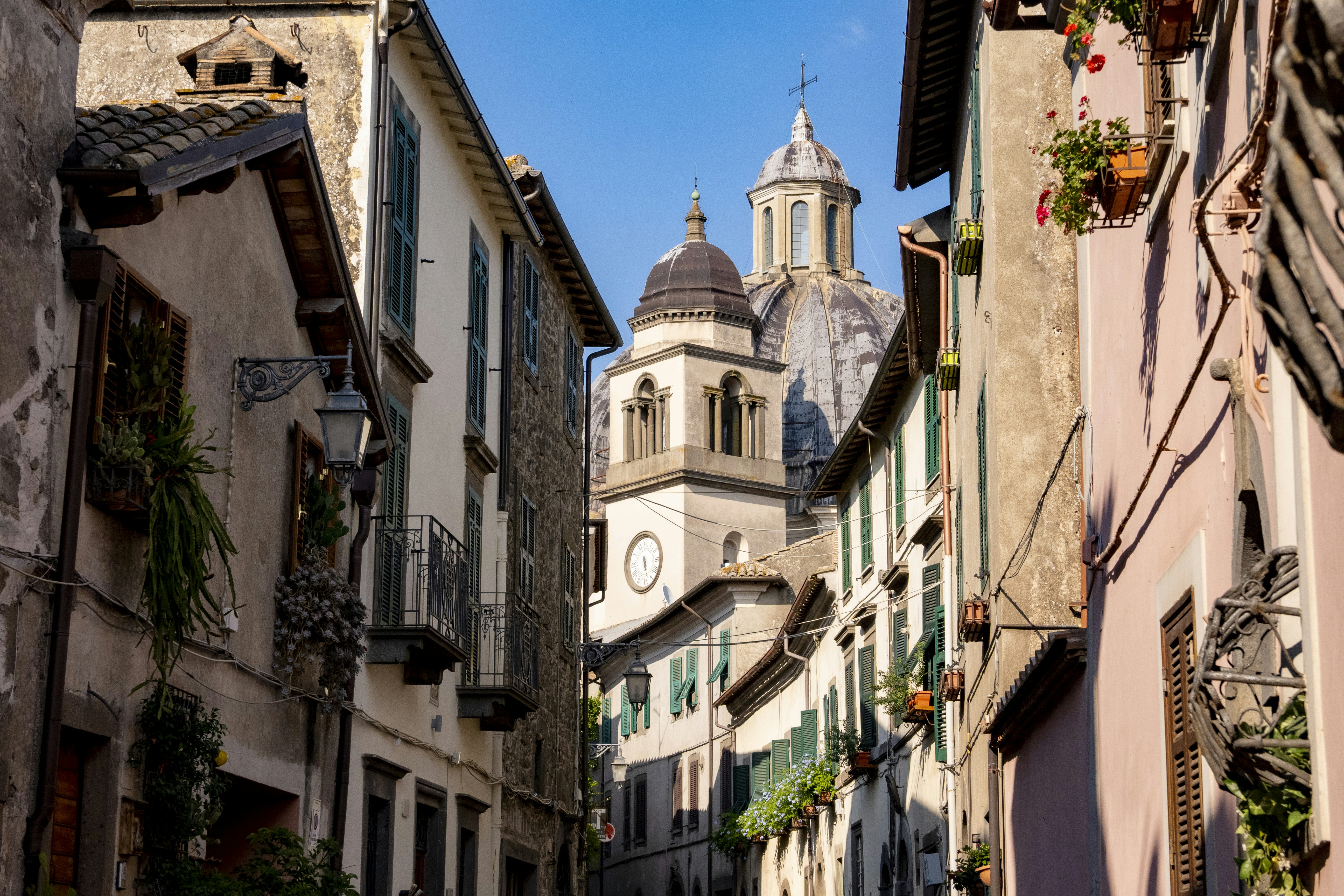 Cobbled Street Toward a Baroque Dome