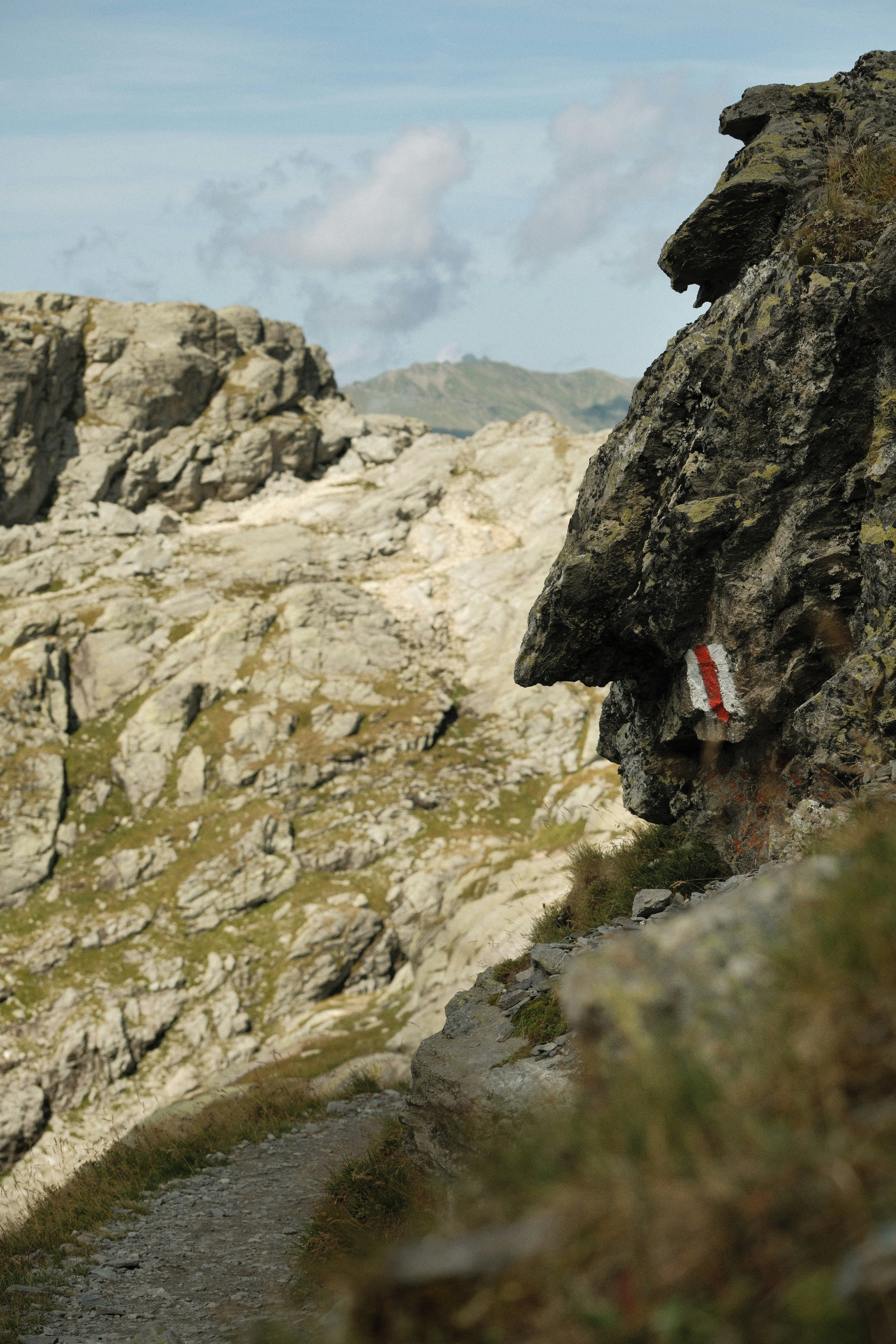 Ridge Marker: A Painted Stripe Stakes the Cliffside Trail