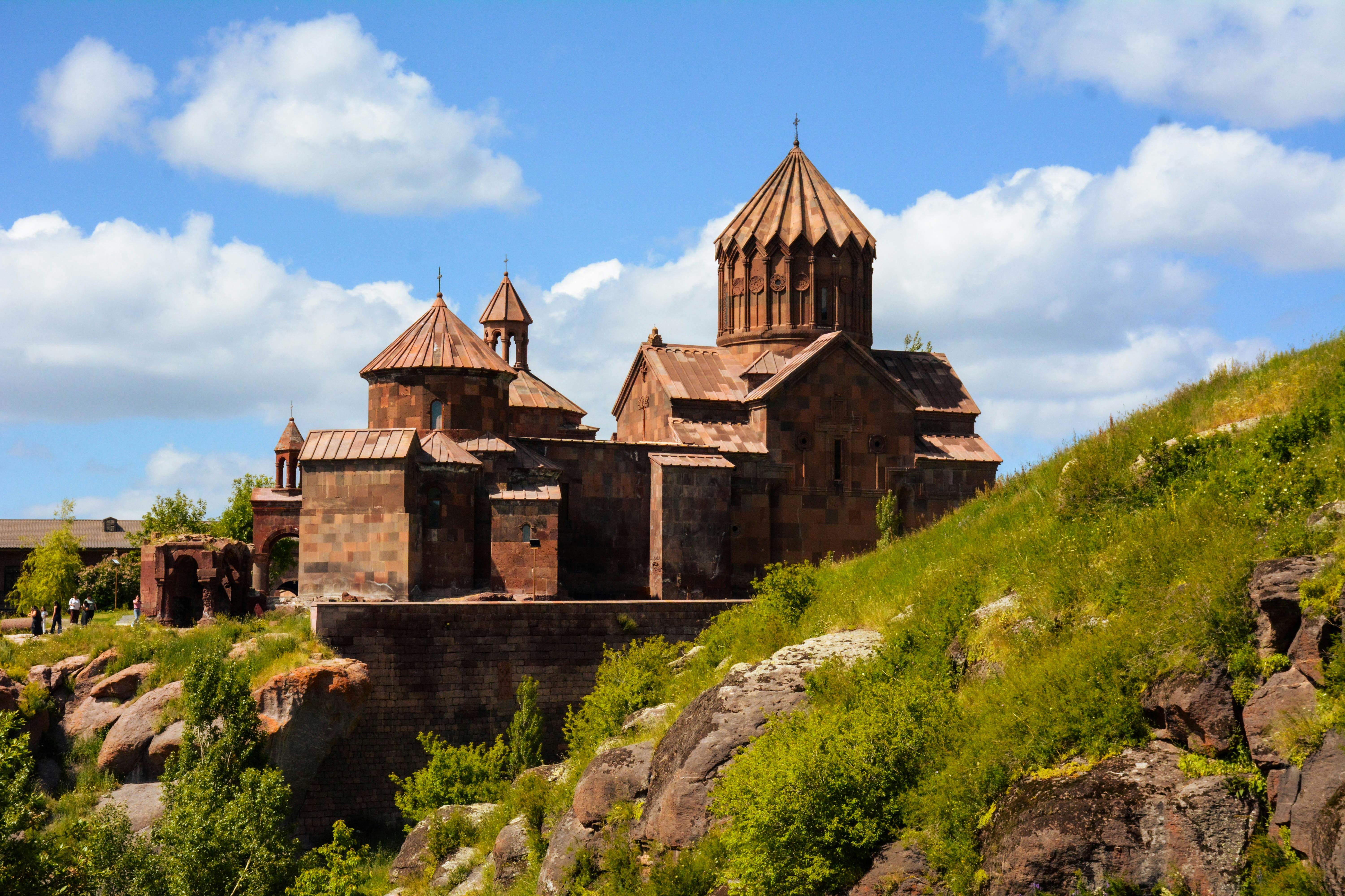 Ancient Red Church on the Hill: Fortified Architecture in Sunset Light