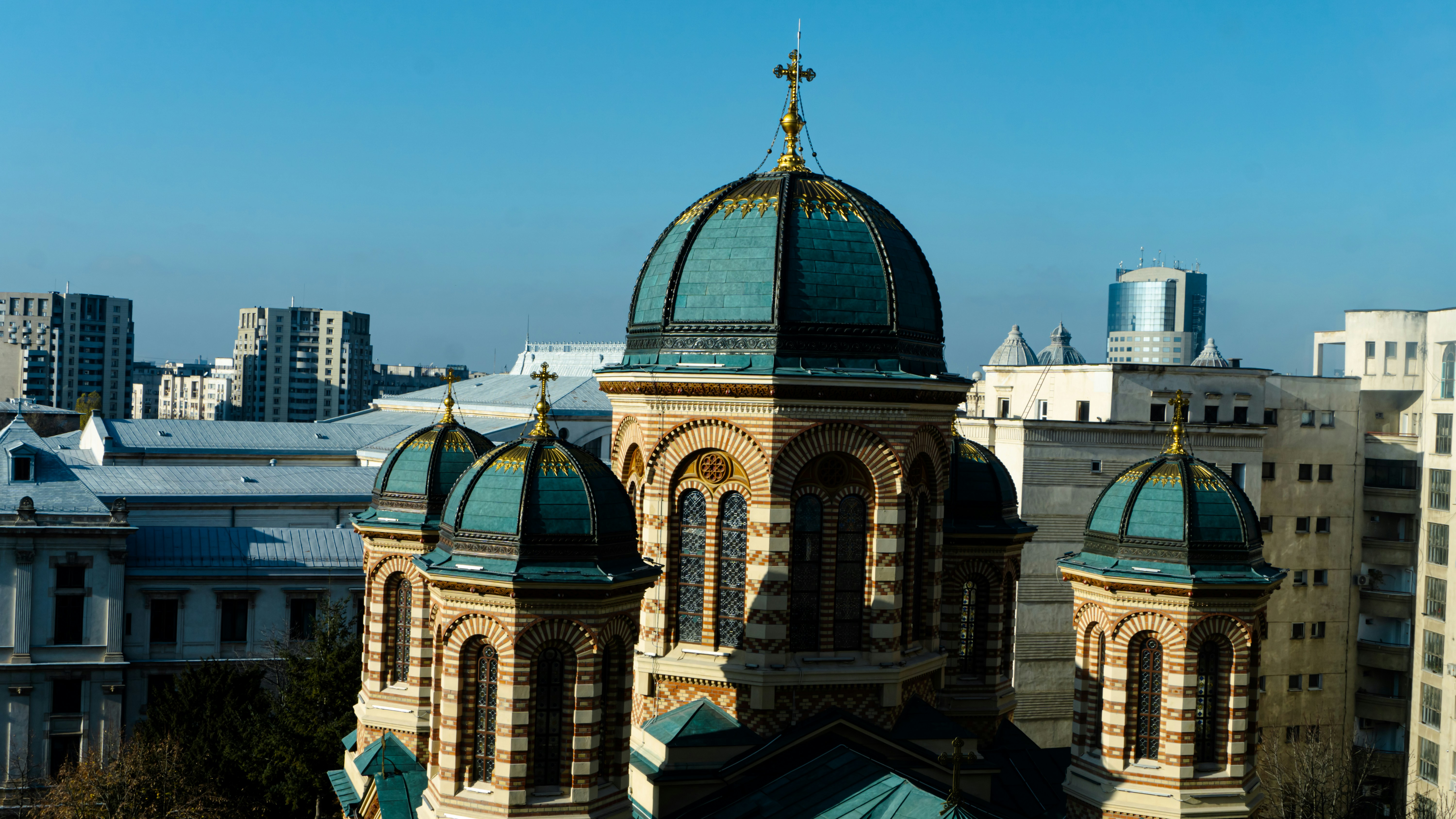 Domed Cathedral Overlooking a Modern Urban Sea