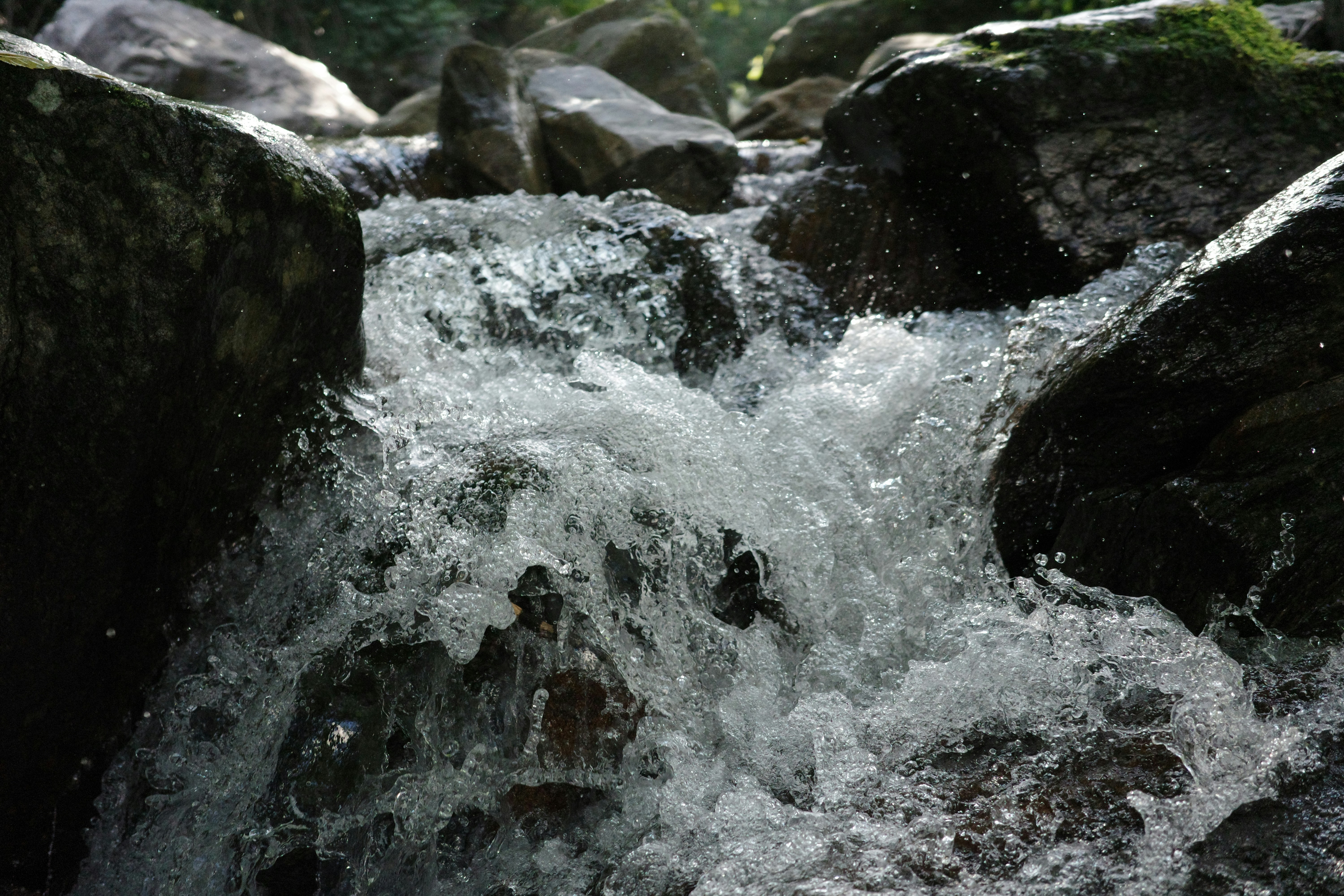Frothing Cascade Between Mossy Stones