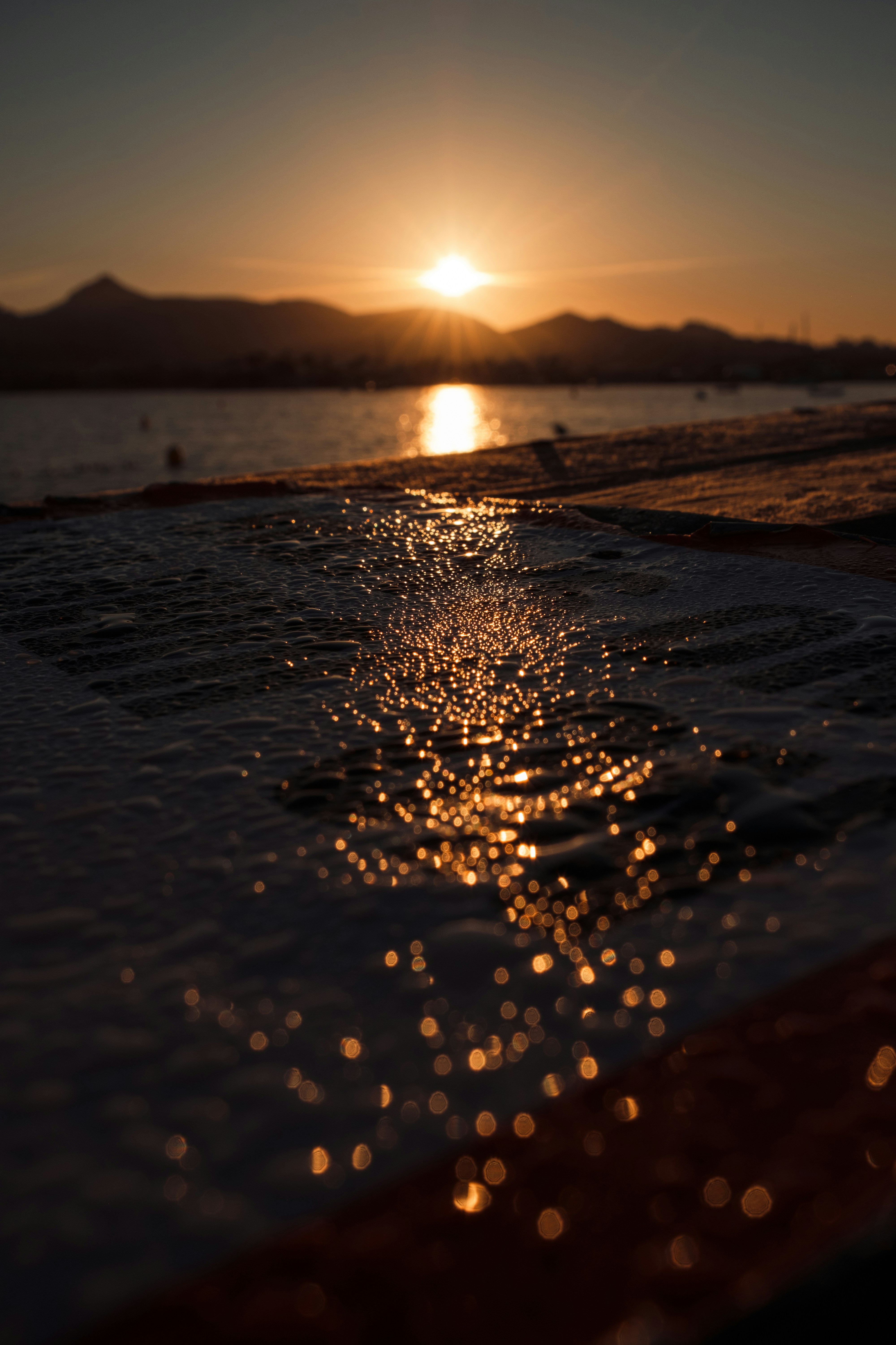 Glowing Tide: Sunset Reflections on a Quiet Shore