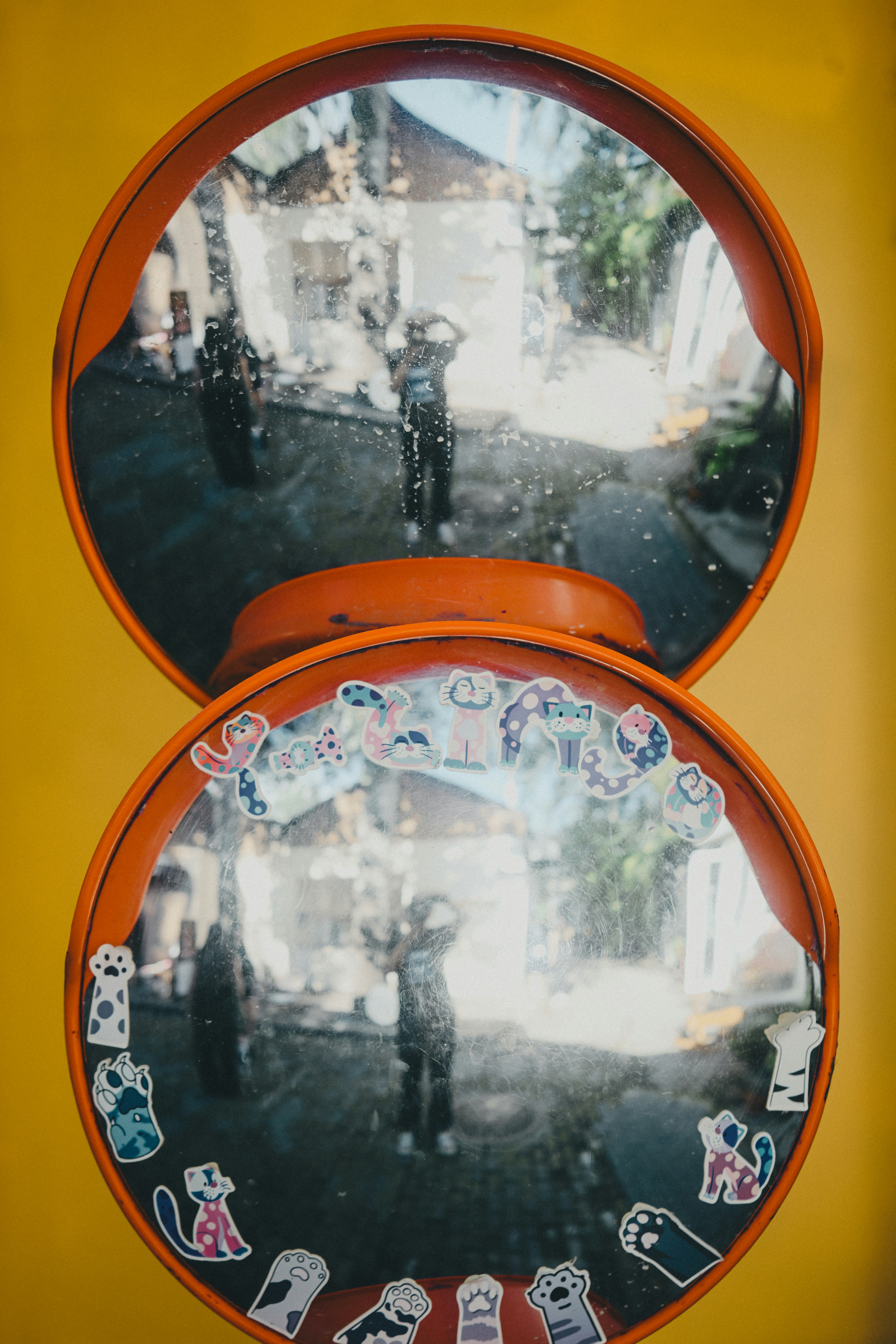 Two Circular Mirrors, One Reflective Path: A Playful Playground Moment