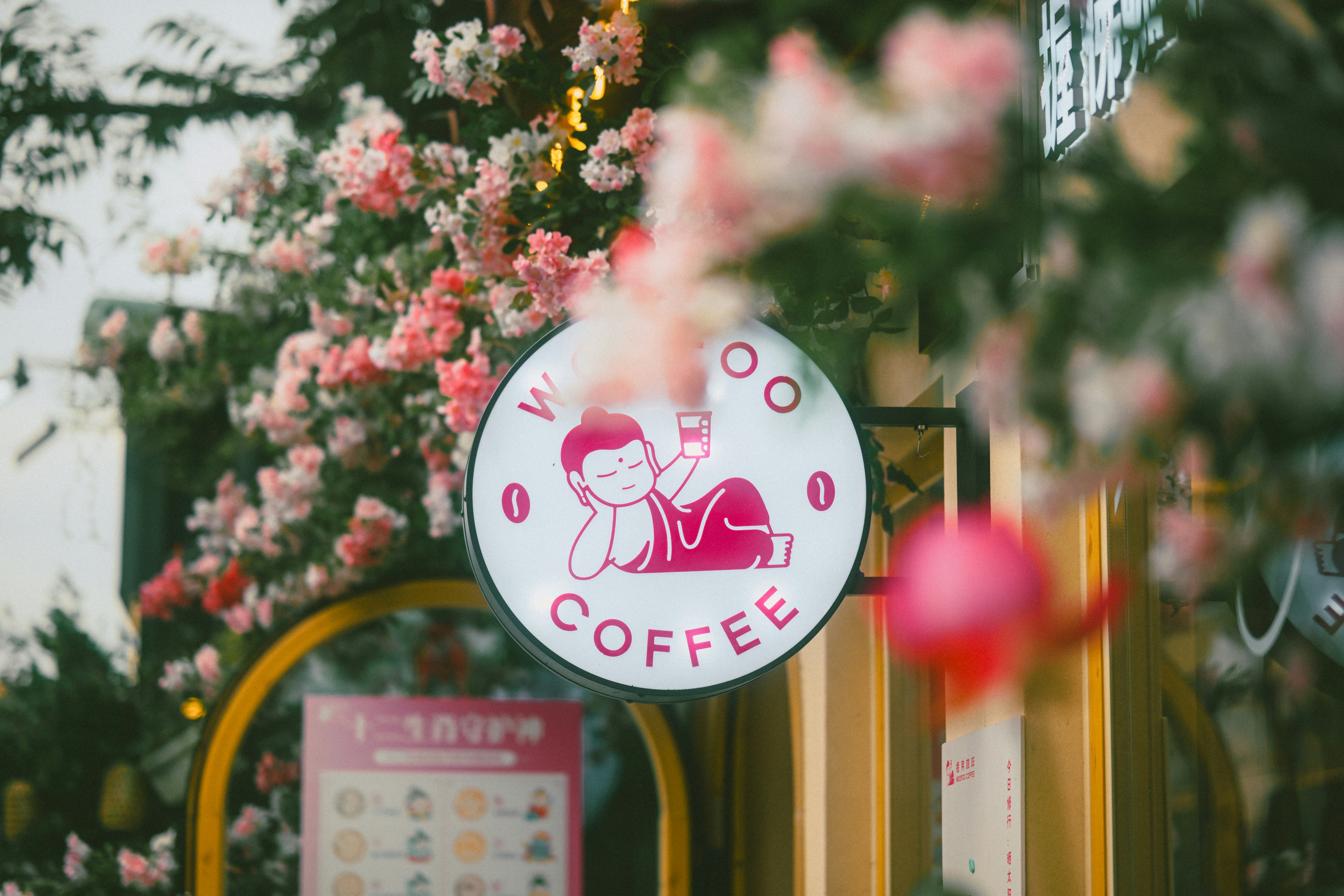 Bright Pink Coffee Signway Between Blossoms