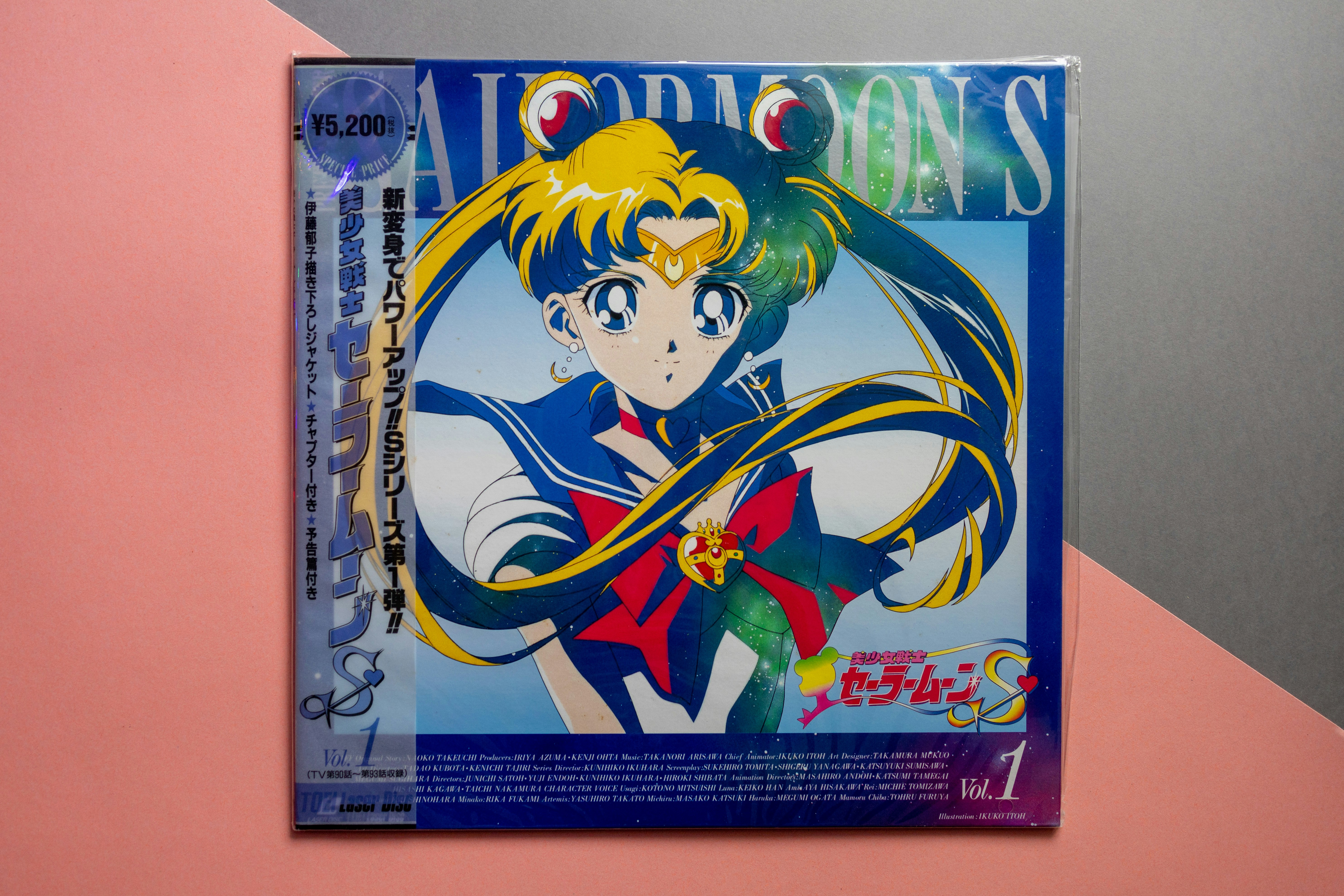 Sailor Moon Prism: Vintage Anime CD Cover on Colored Backdrop