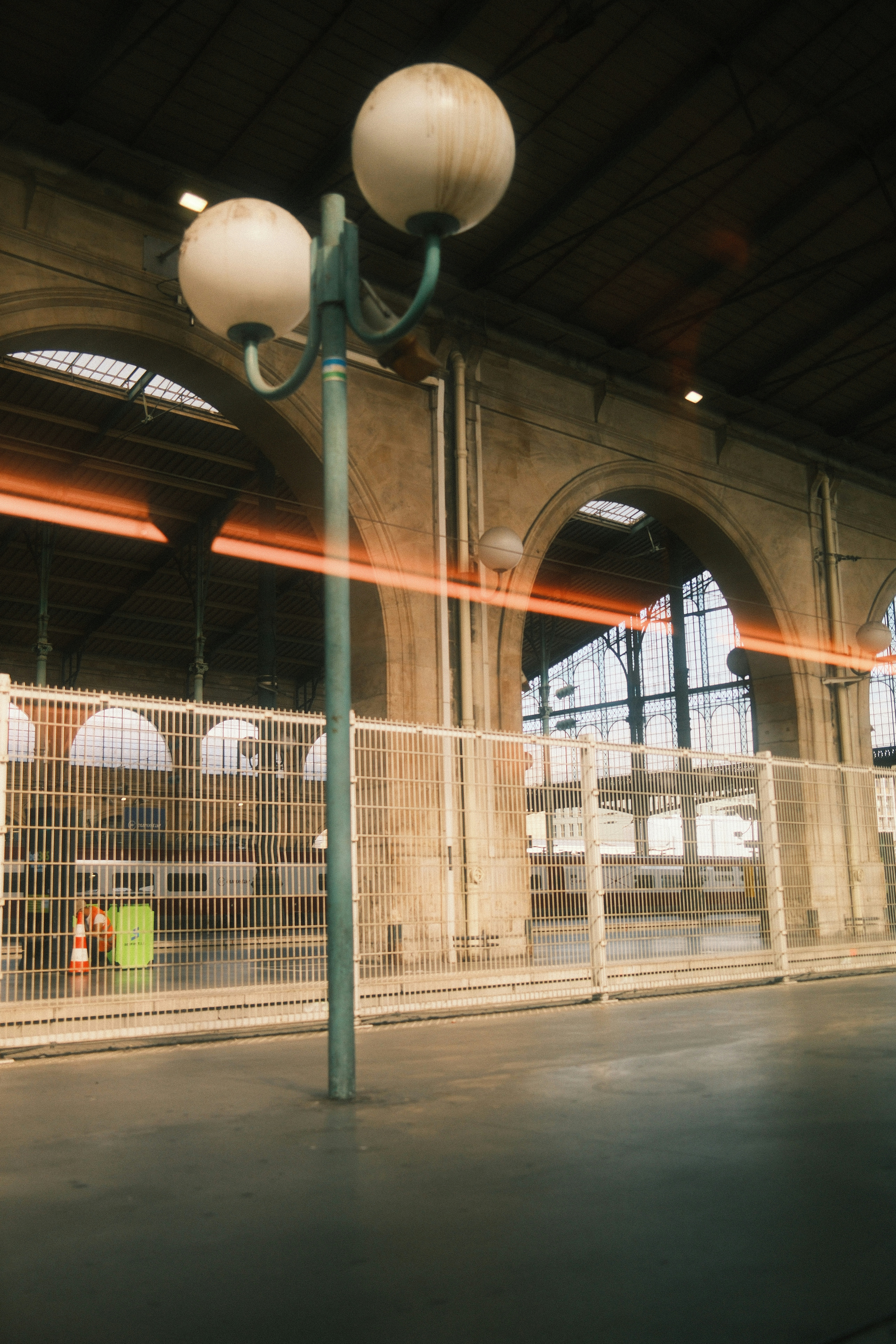 Industrial Platform at Dusk: Light Trails Over a Heritage Station