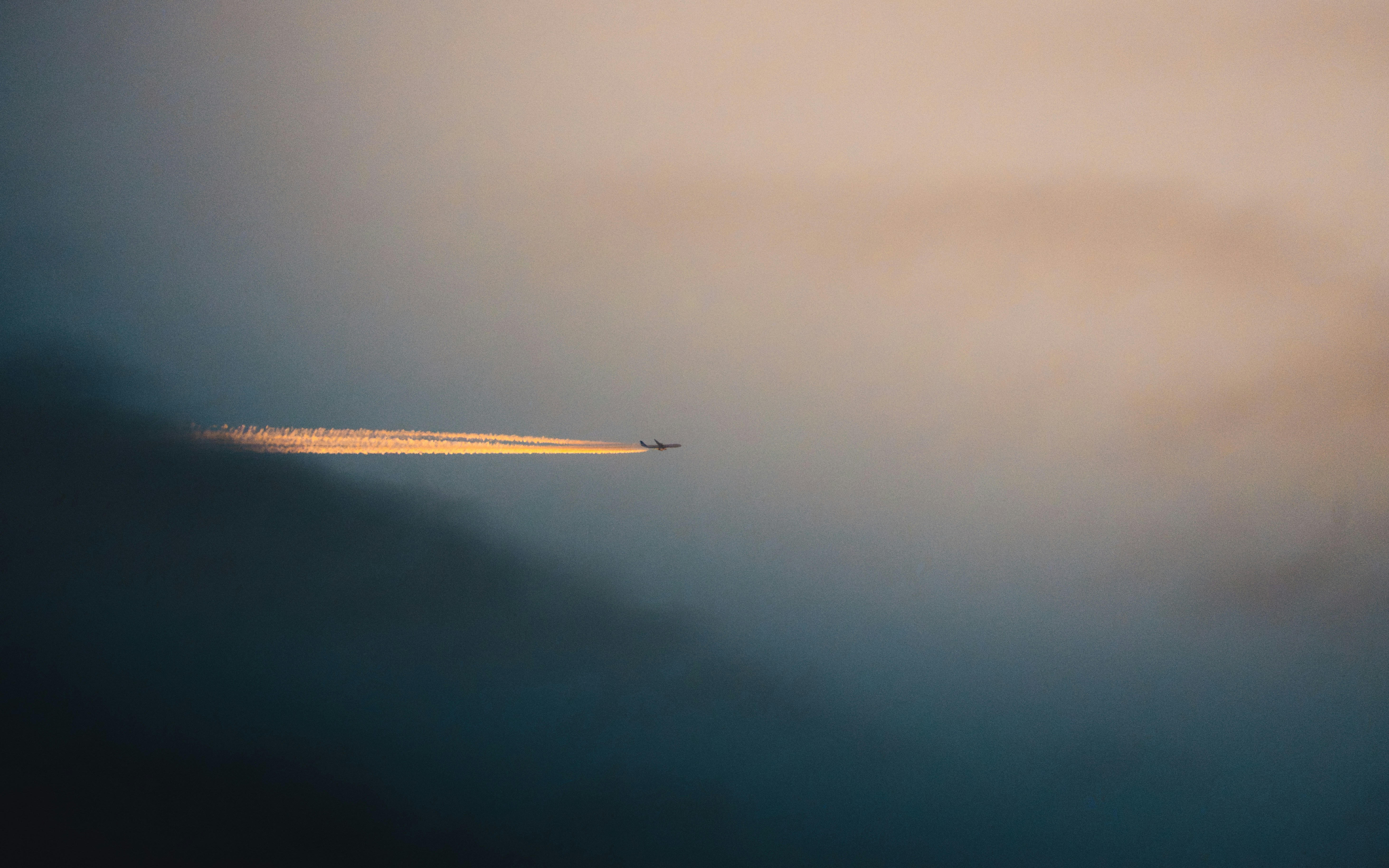 Sliver of Dawn: A Lone Boat Carves a Quiet Wake