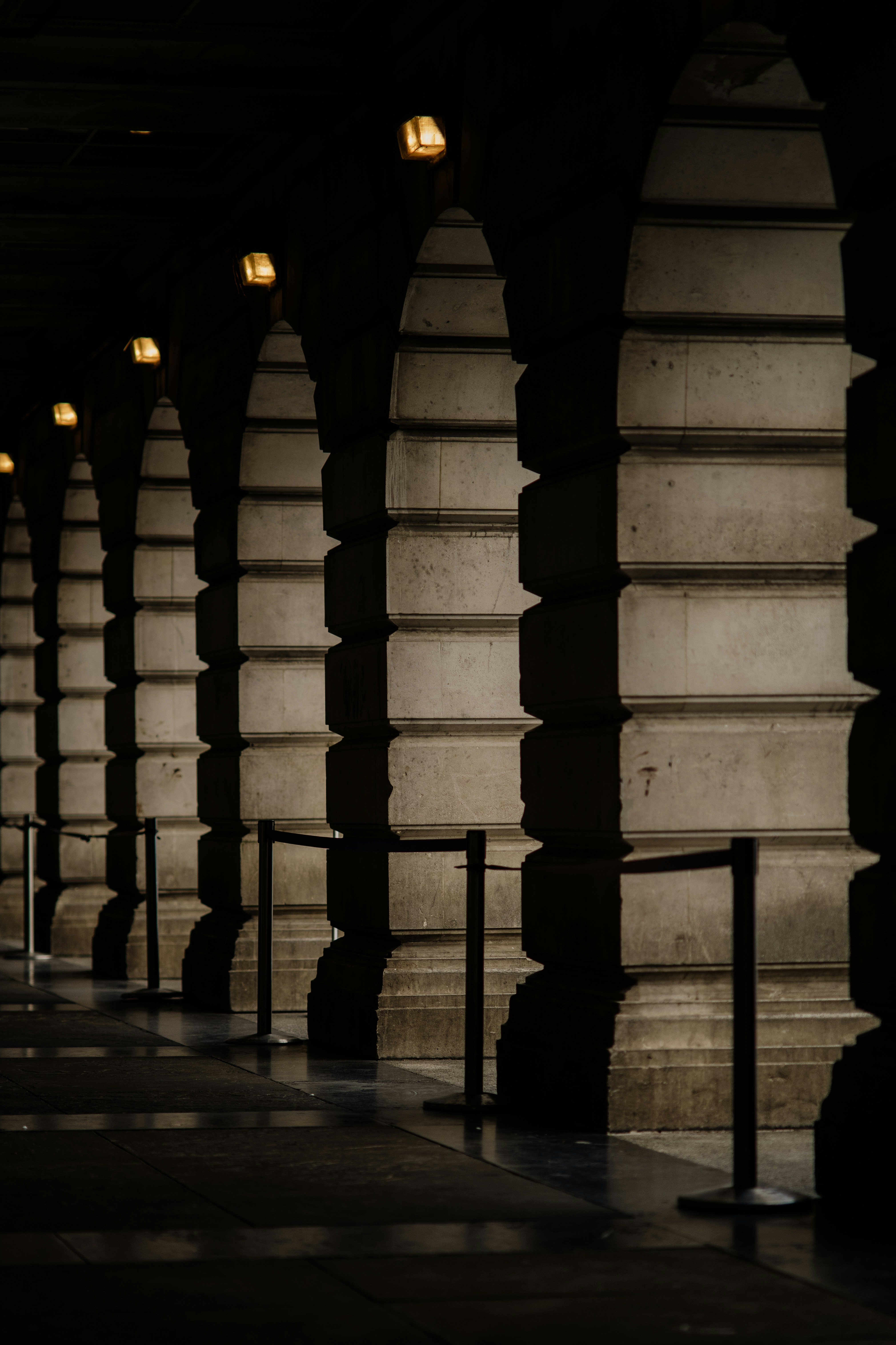 Columns in Shadow: A Monochrome Corridor of Light