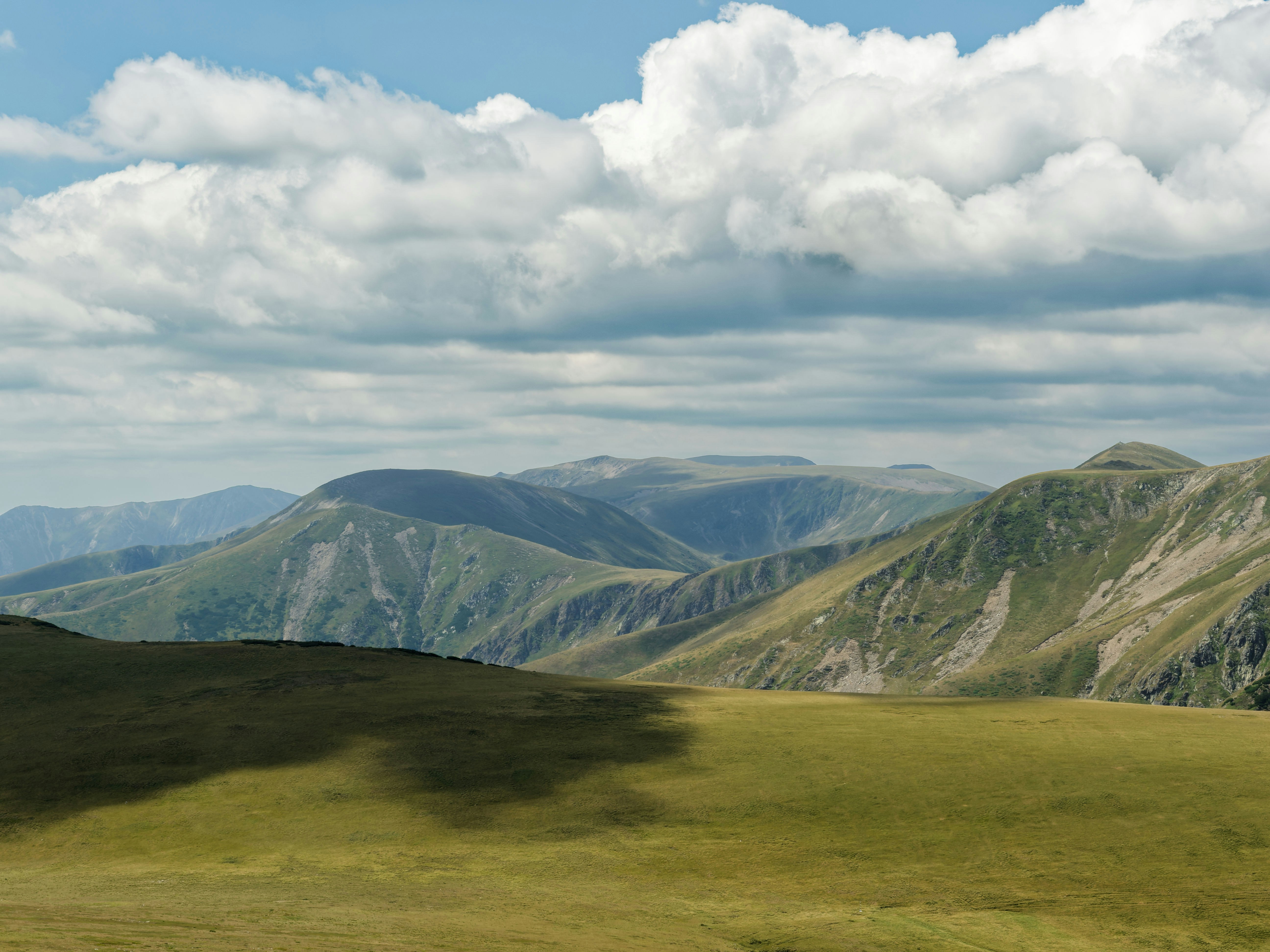 Valley Horizon under a Patchwork Sky