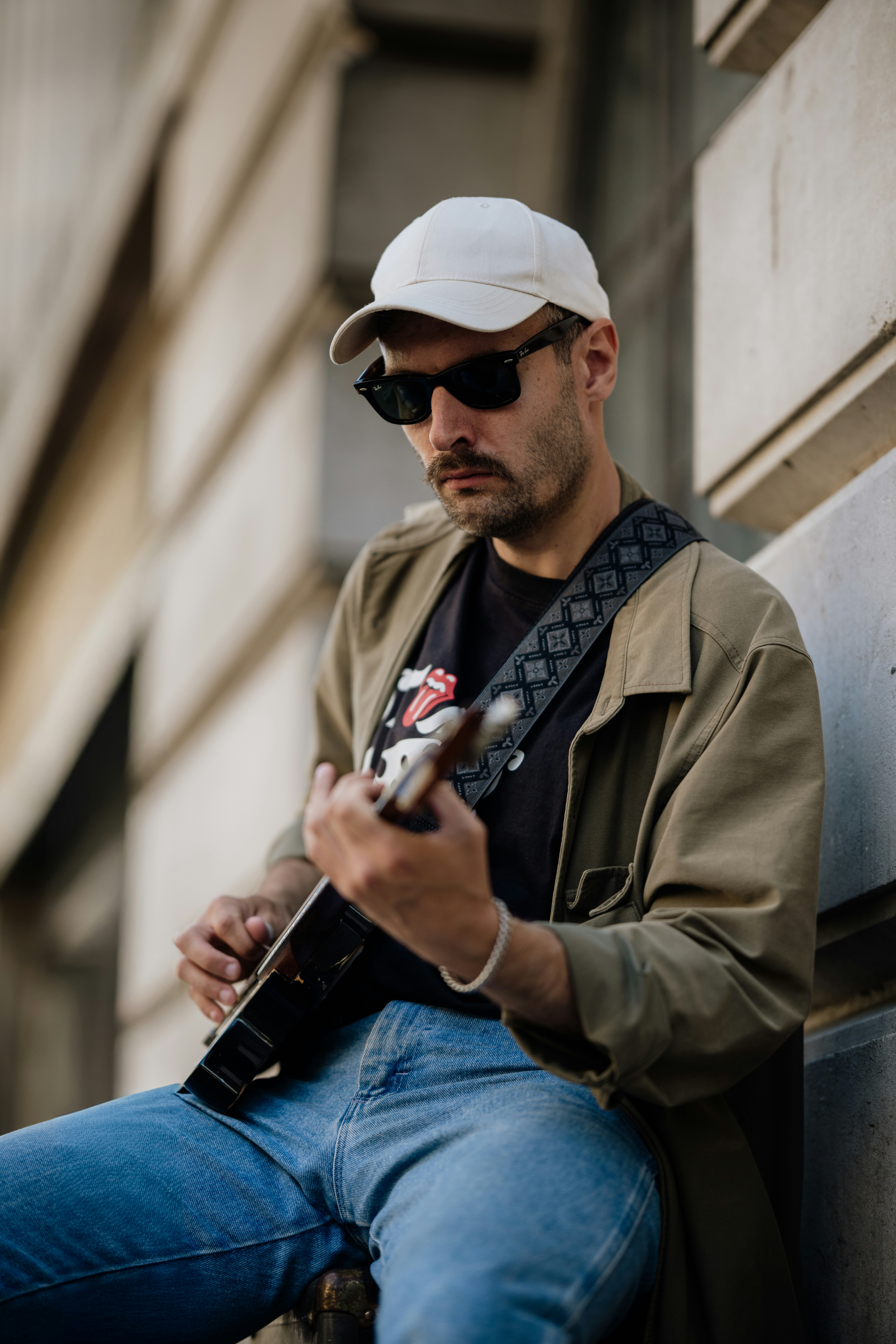 Guitar in the City: Quiet Confidence in the Concrete Light