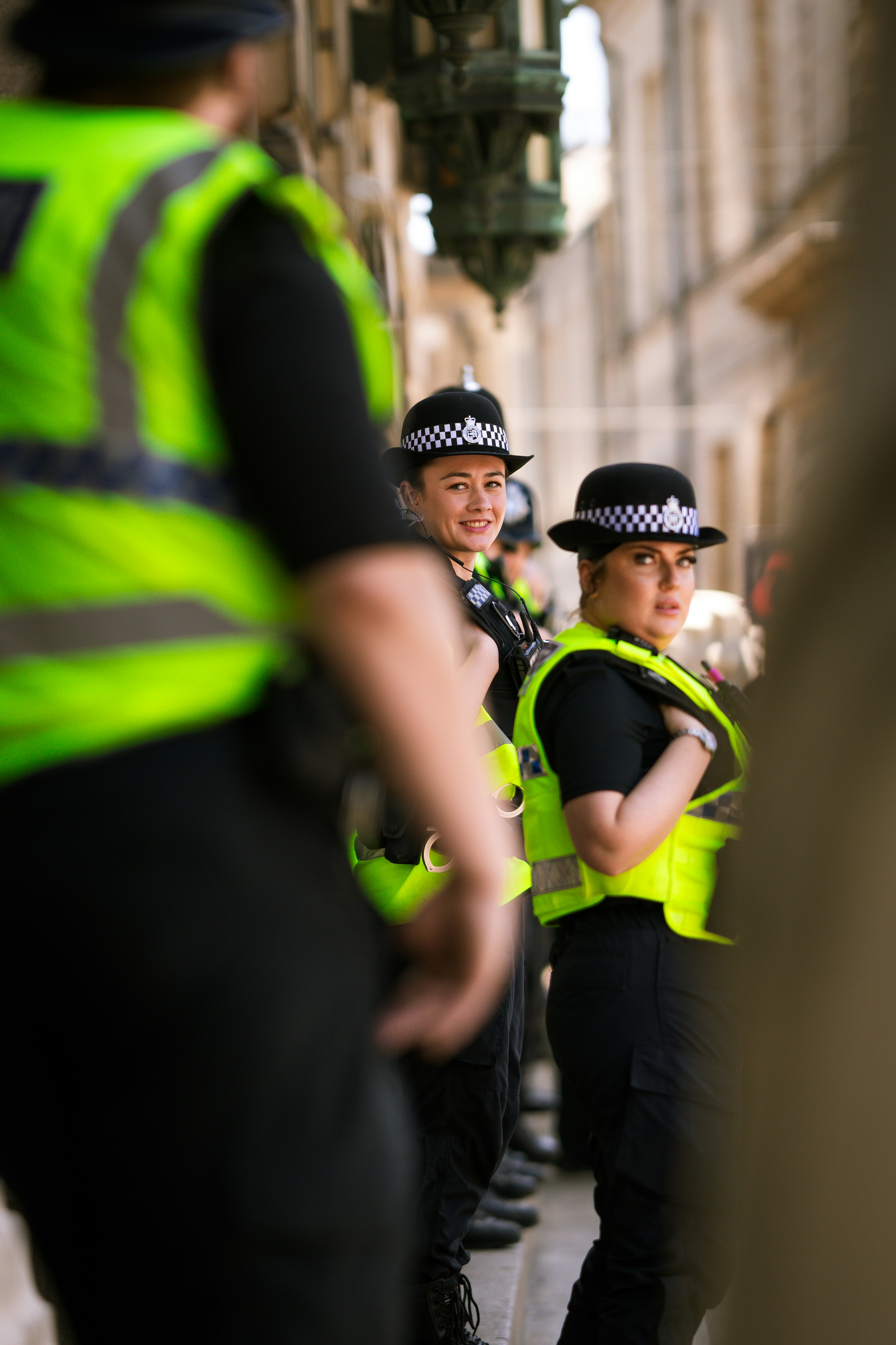 Bright Vests, Quiet Authority: Faces in the Line
