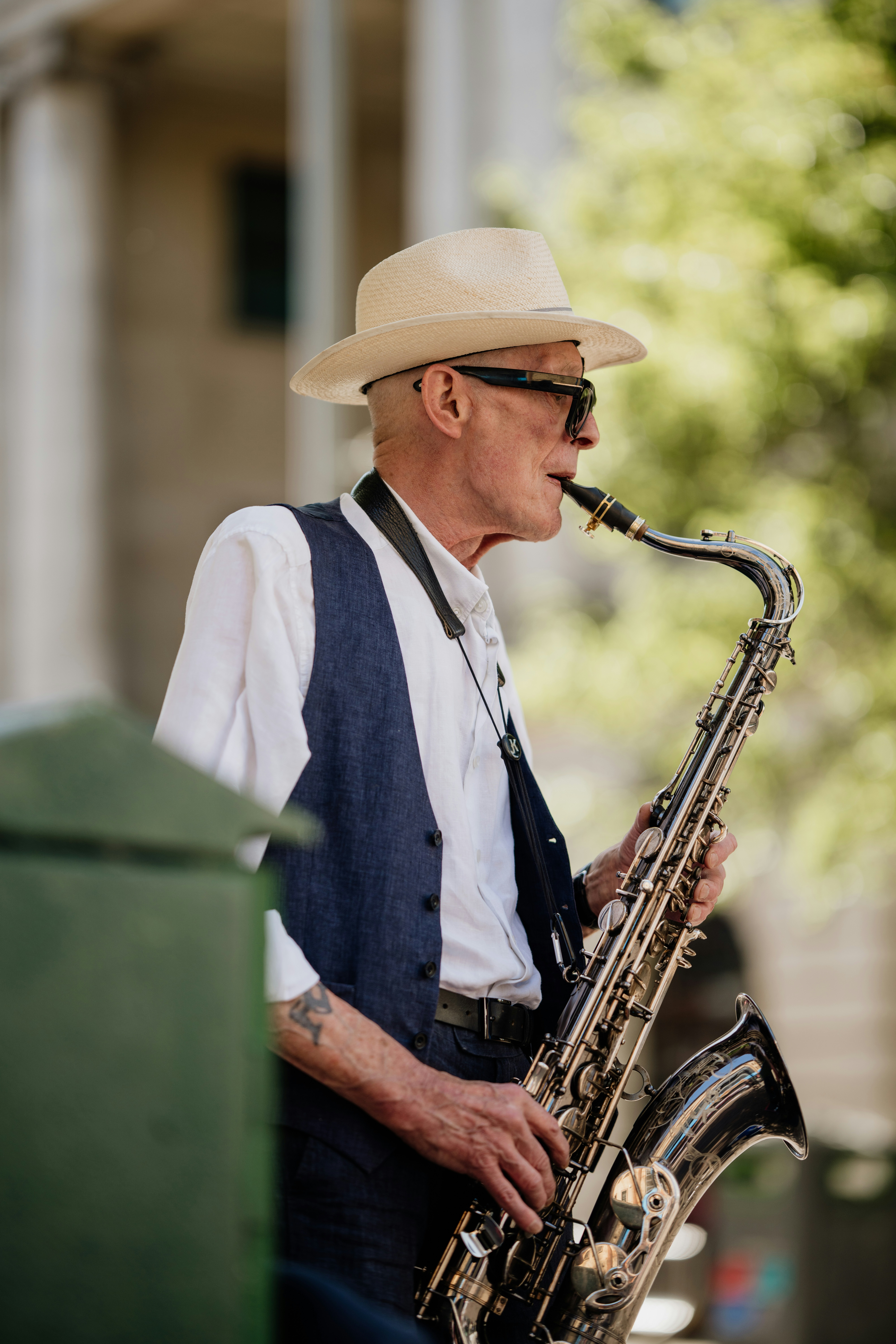 Saxophone Soul: A Street Musician in Signature Attire
