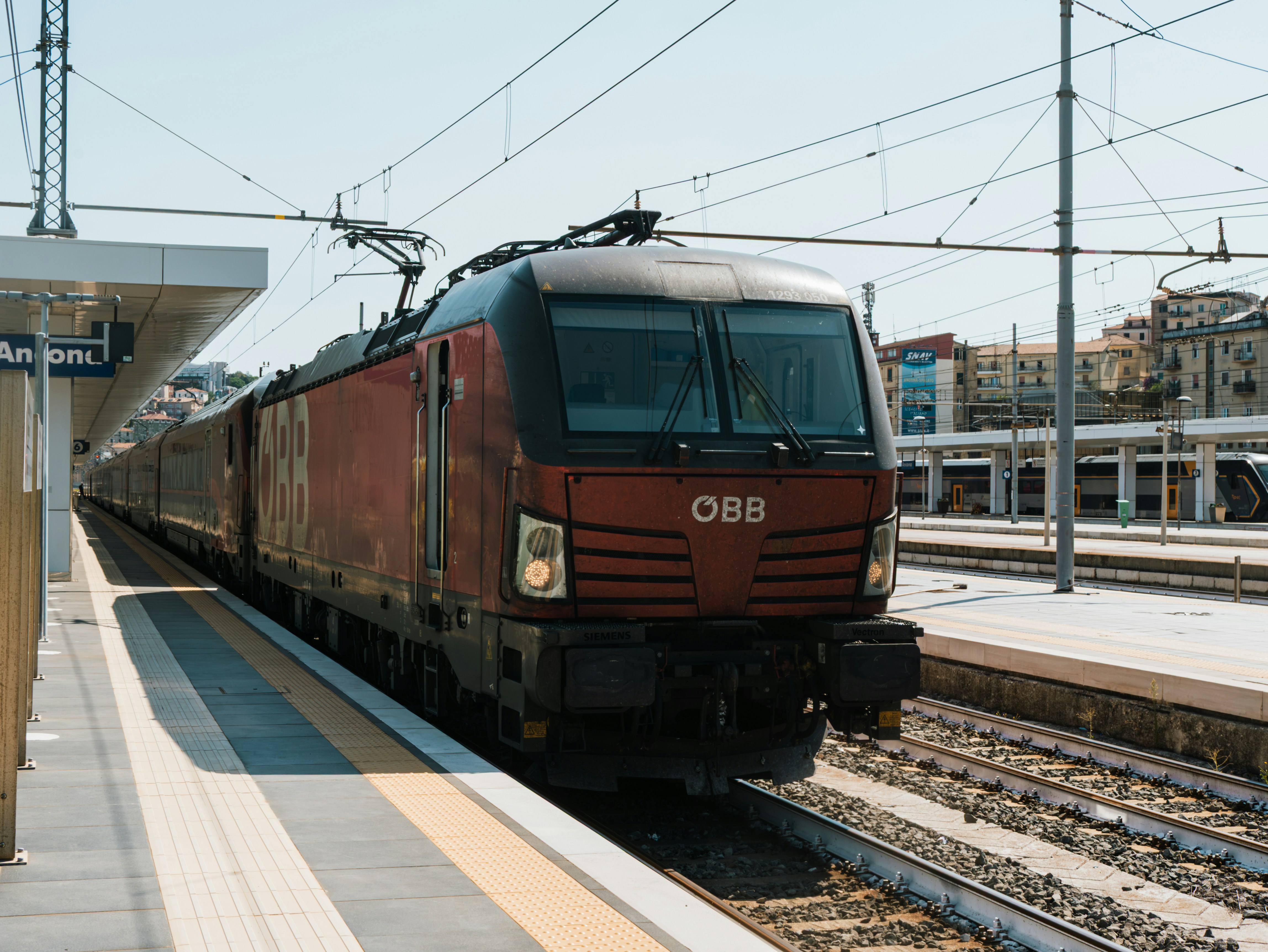 Red Intercity: A locomotive leading the afternoon commute