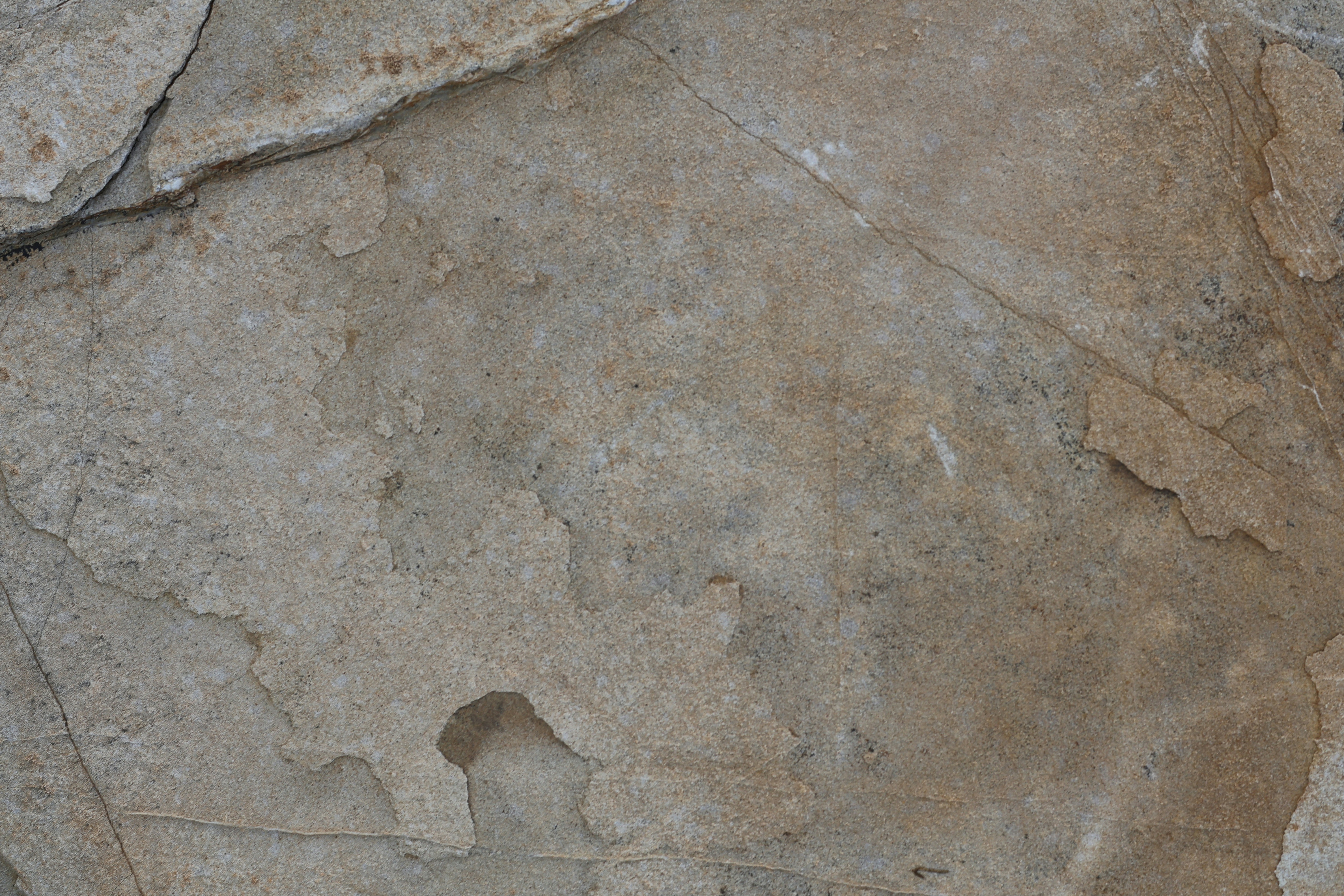 Weathered Rock Canvas: Subtle Fractures and Texture in Natural Stone