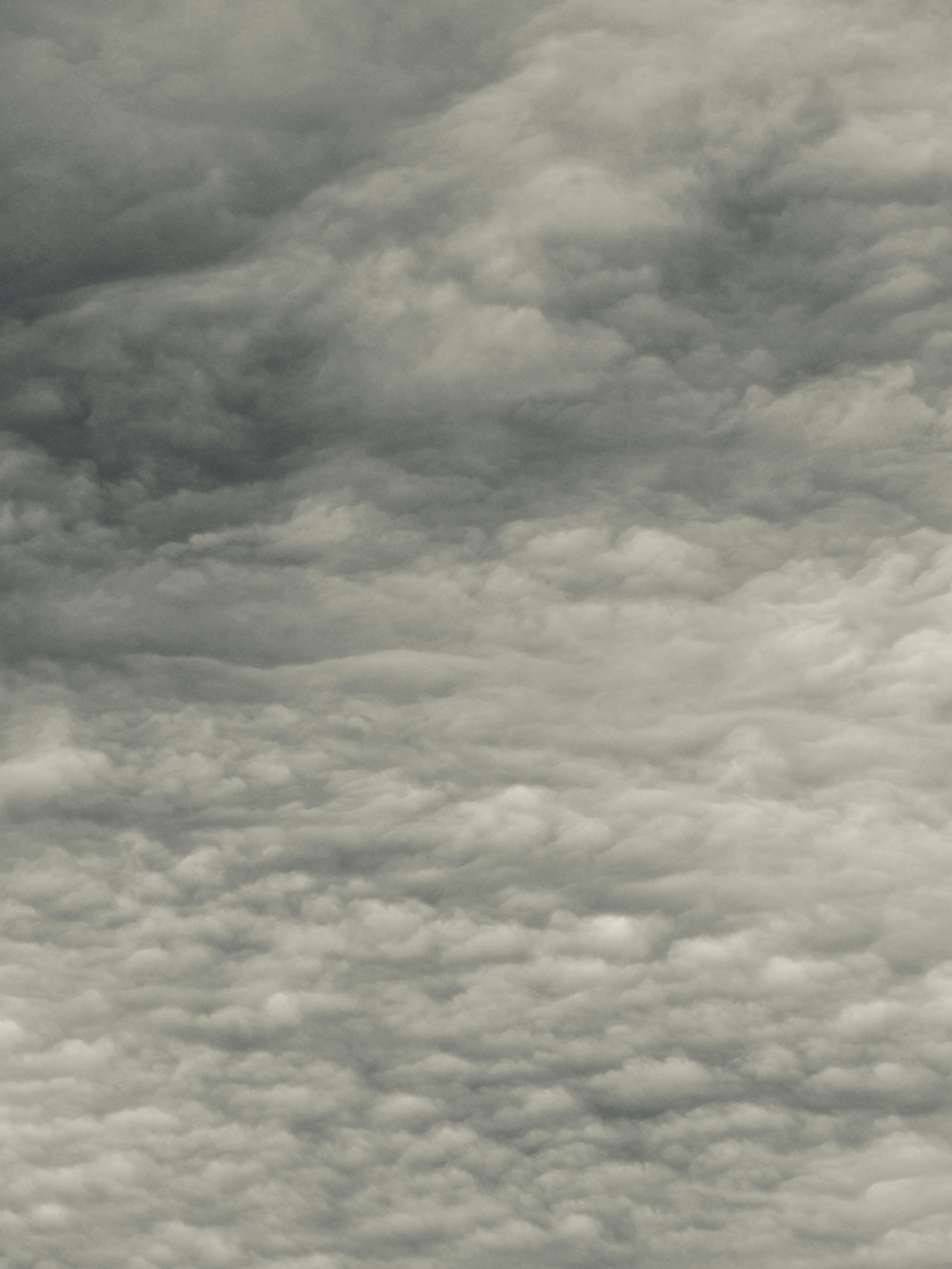 Layered Skies: A Quiet Field of Clouds from Above