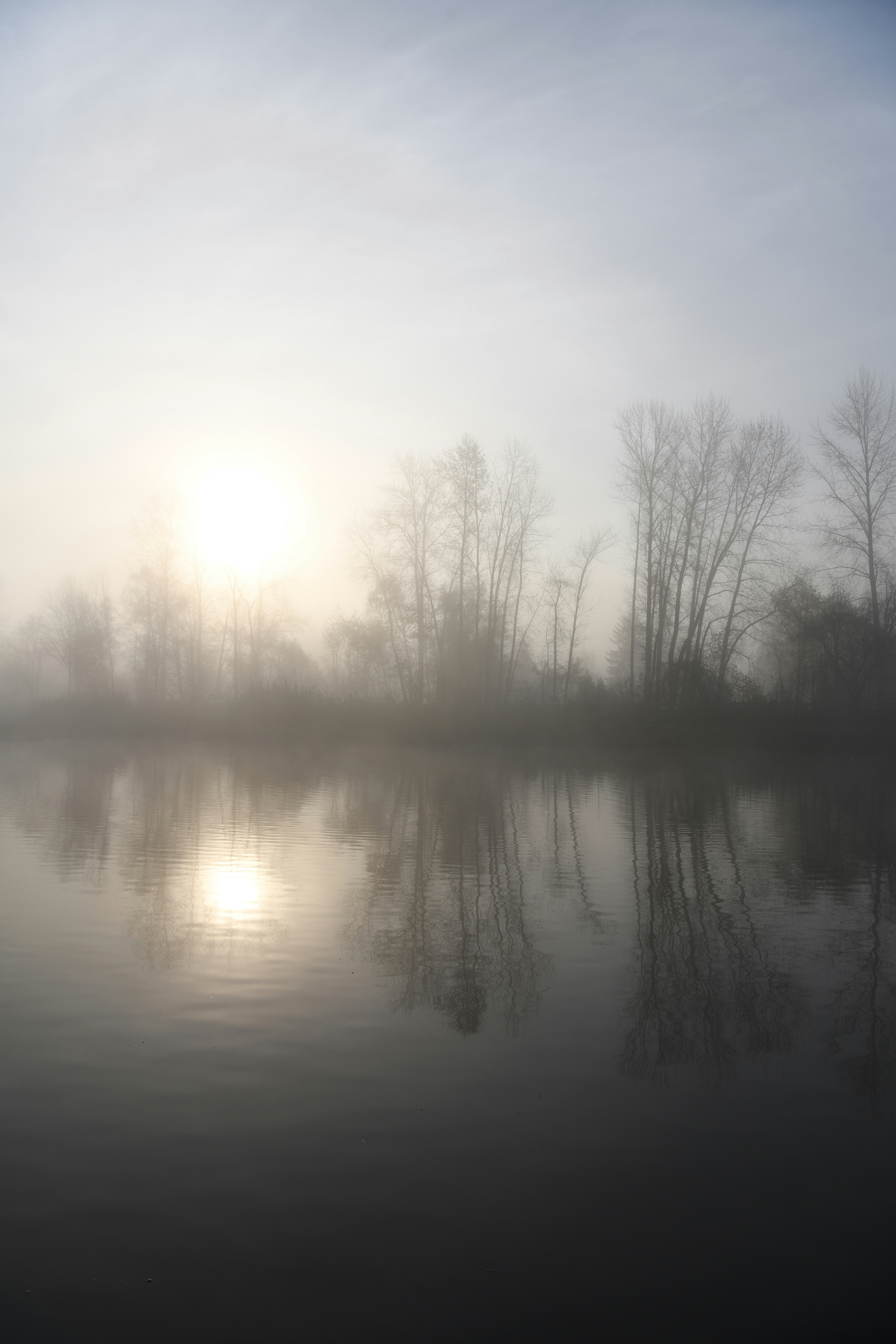 Mistbound Sunrise Over Quiet River