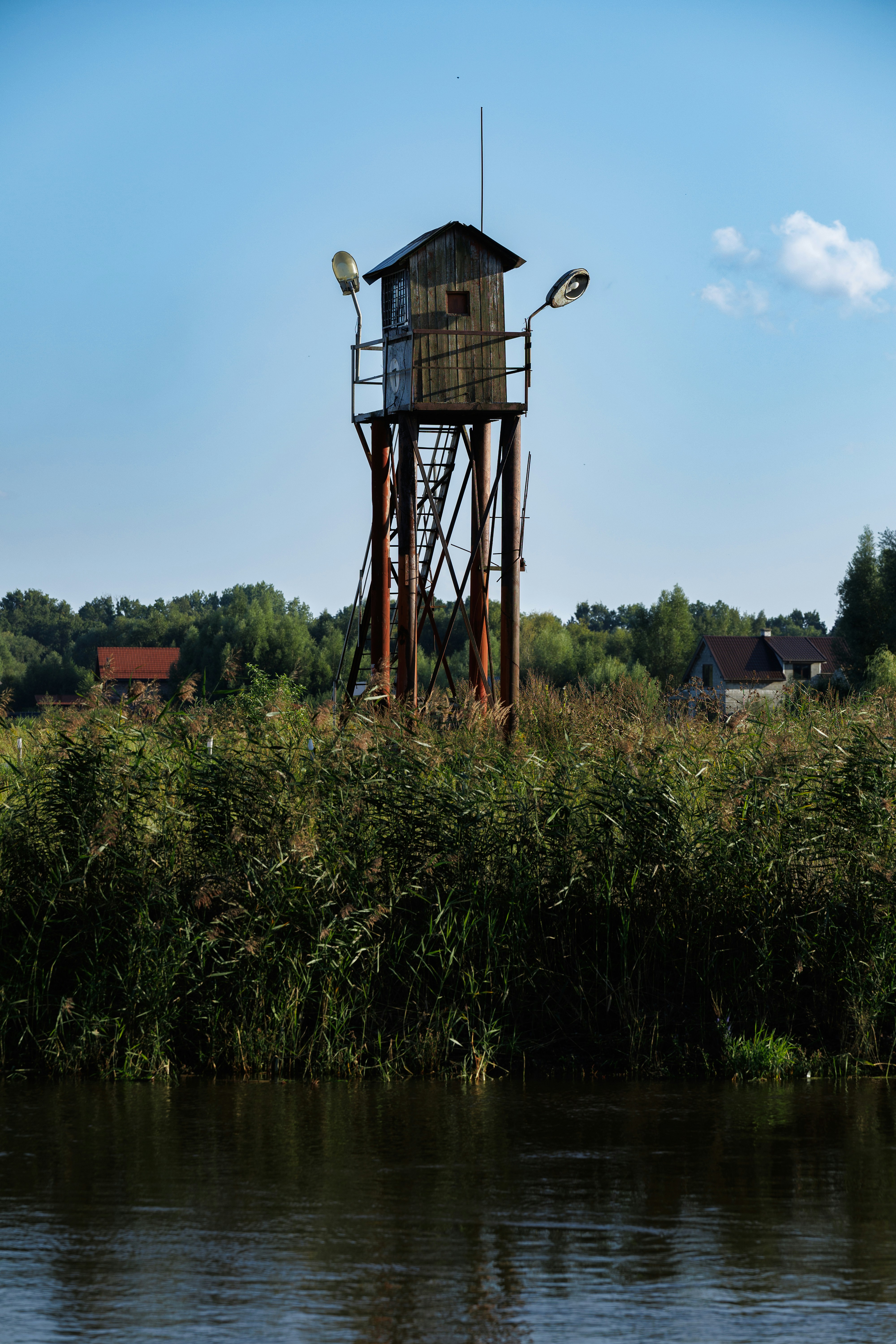 Watchtower Over the River: A Quiet Post at Dusk