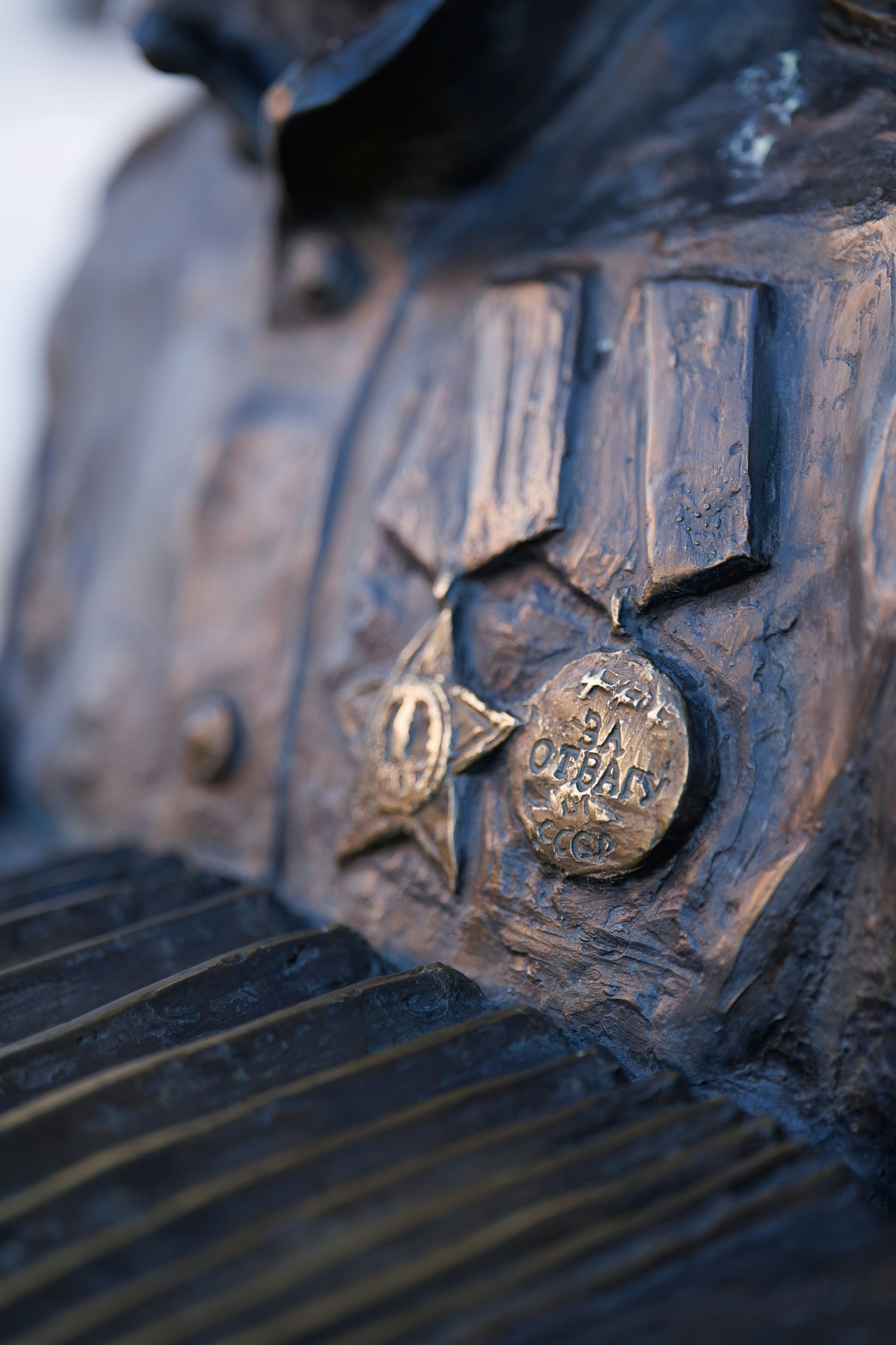 Weathered Engine Plate: A Close-Up of the Old Machinery Bolt
