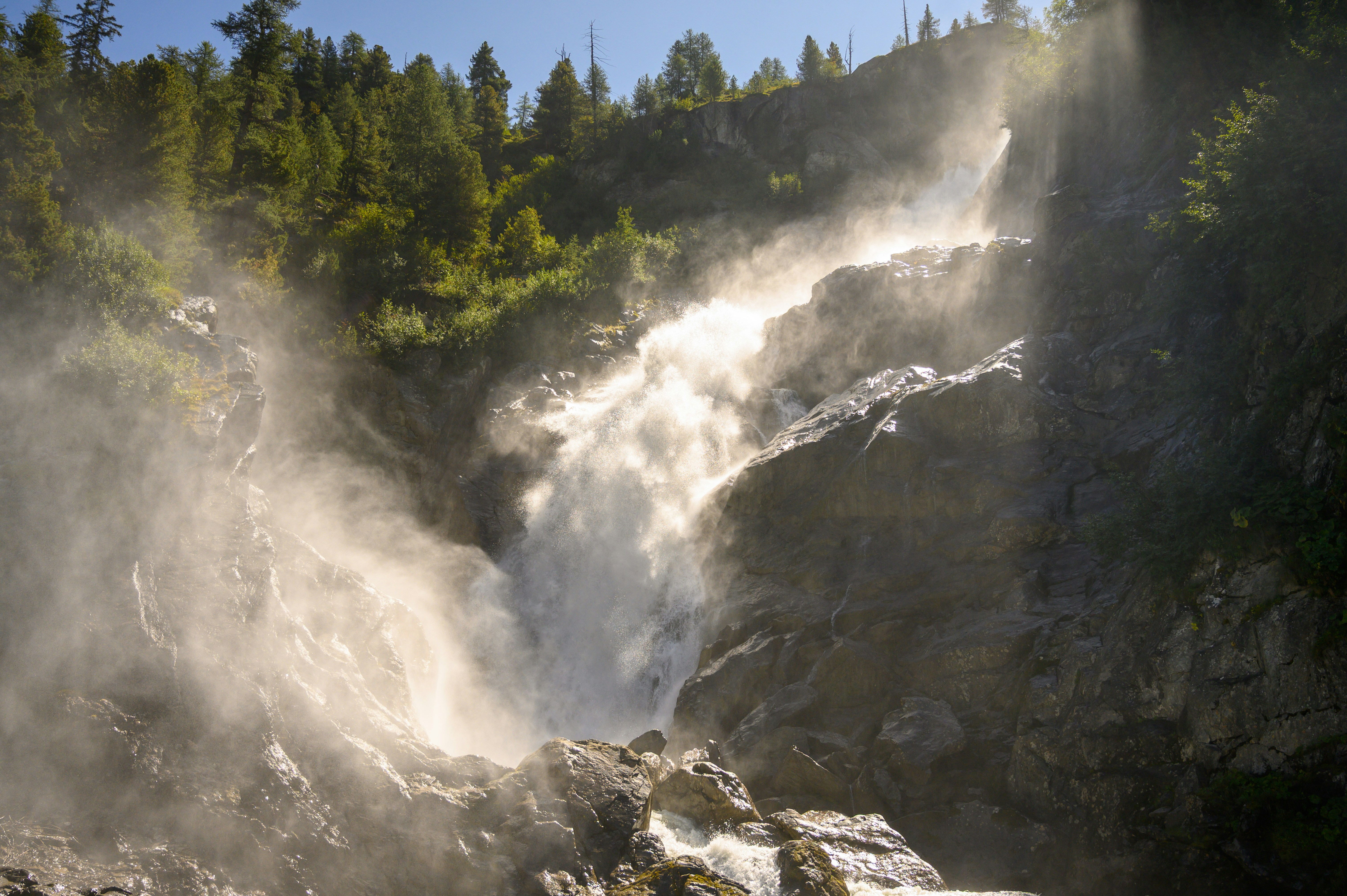 Mist-Soaked Cascade: Light Through the Gorge