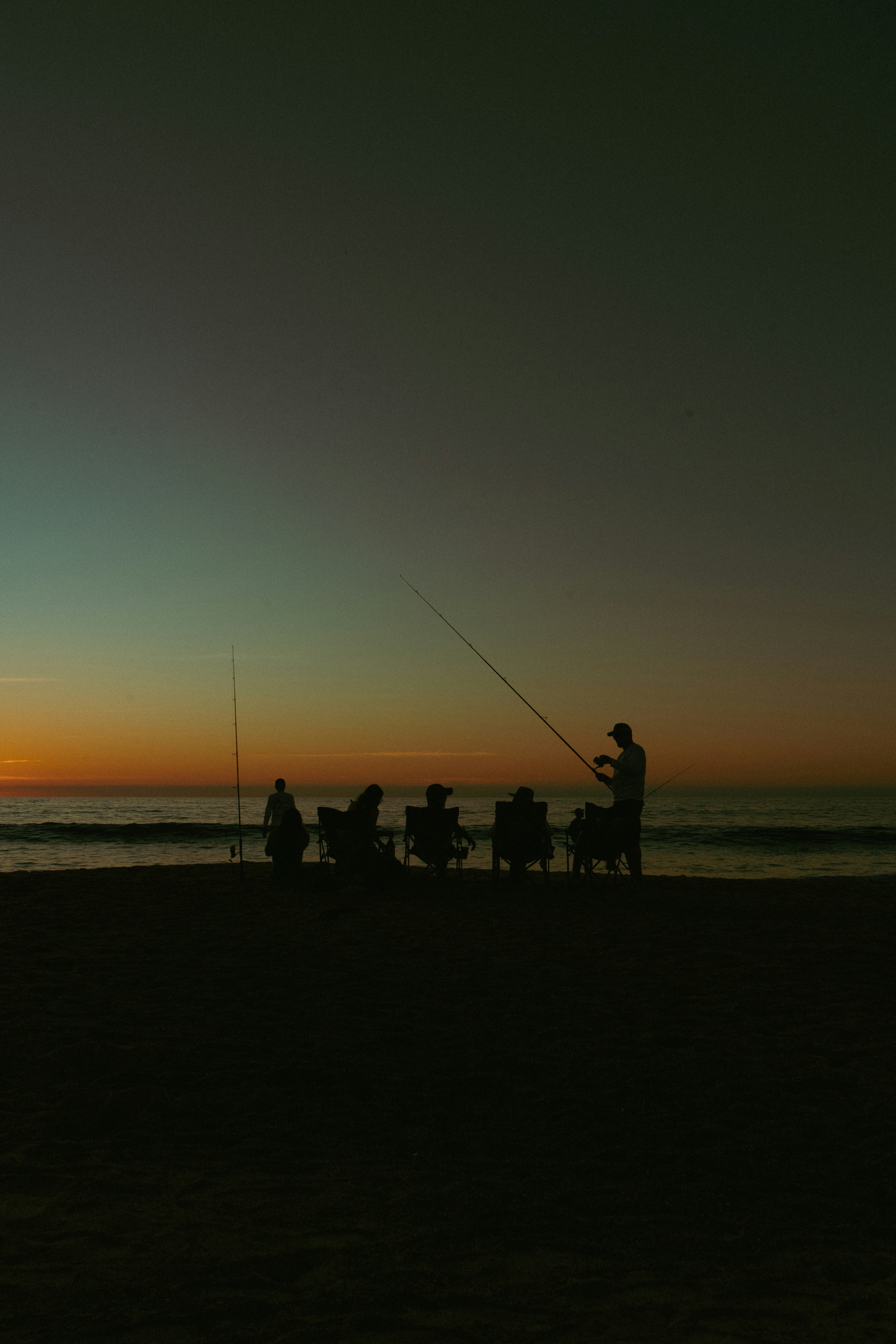 Sunset Silhouettes: A Family Session by the Shore