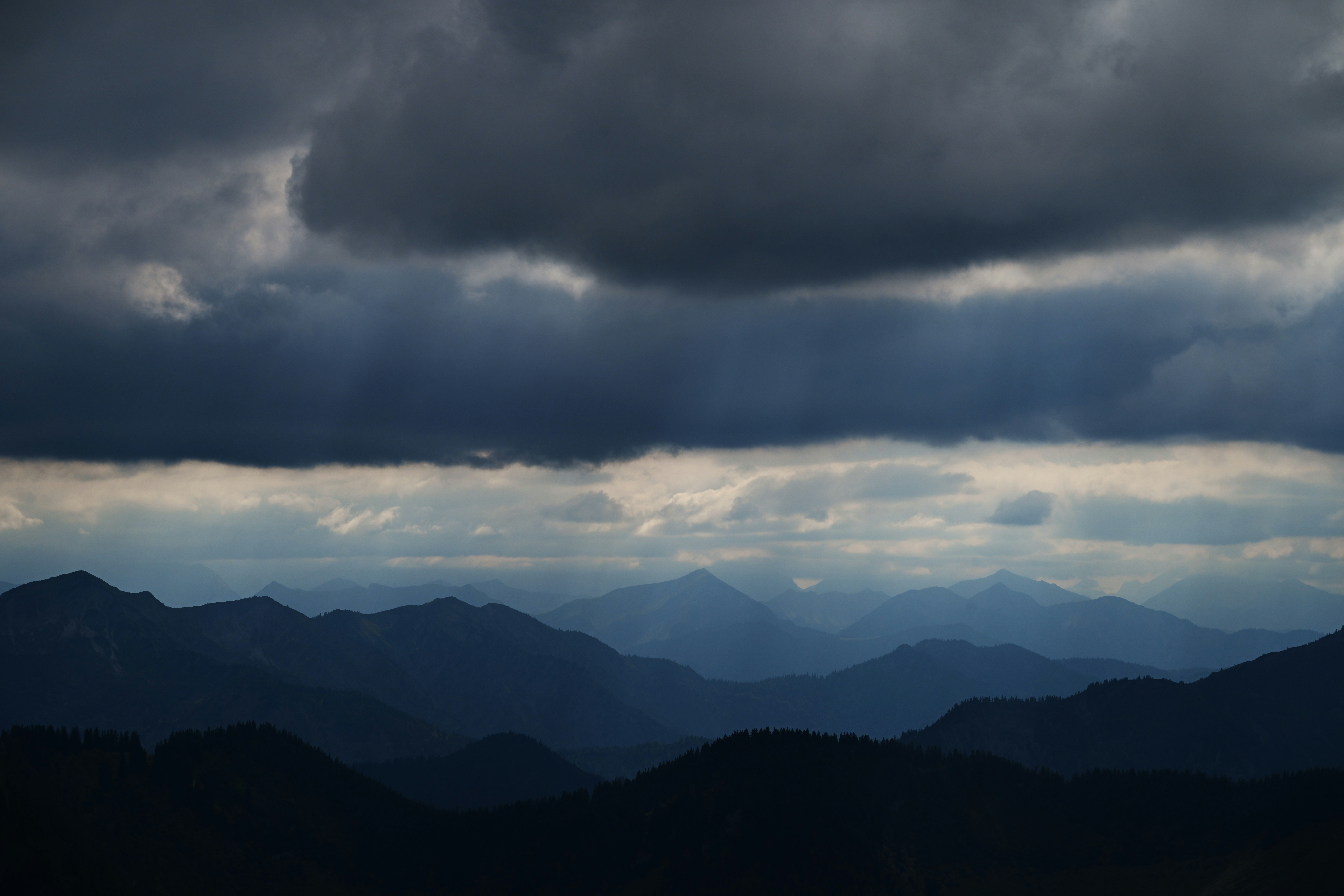 Midnight Silhouettes Over Alpine Ridges