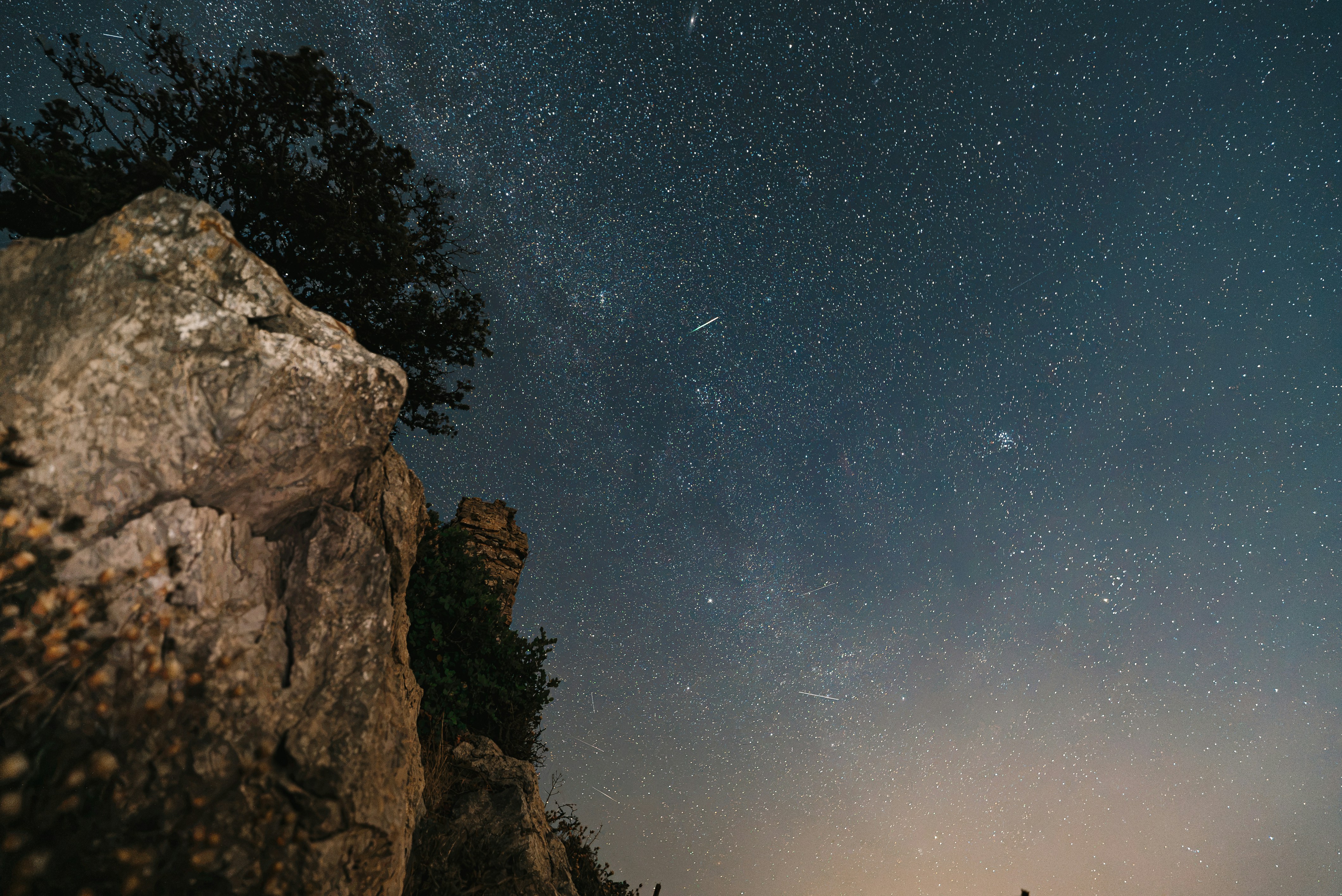 Starfall over the Cliff: A Quiet Nightscape