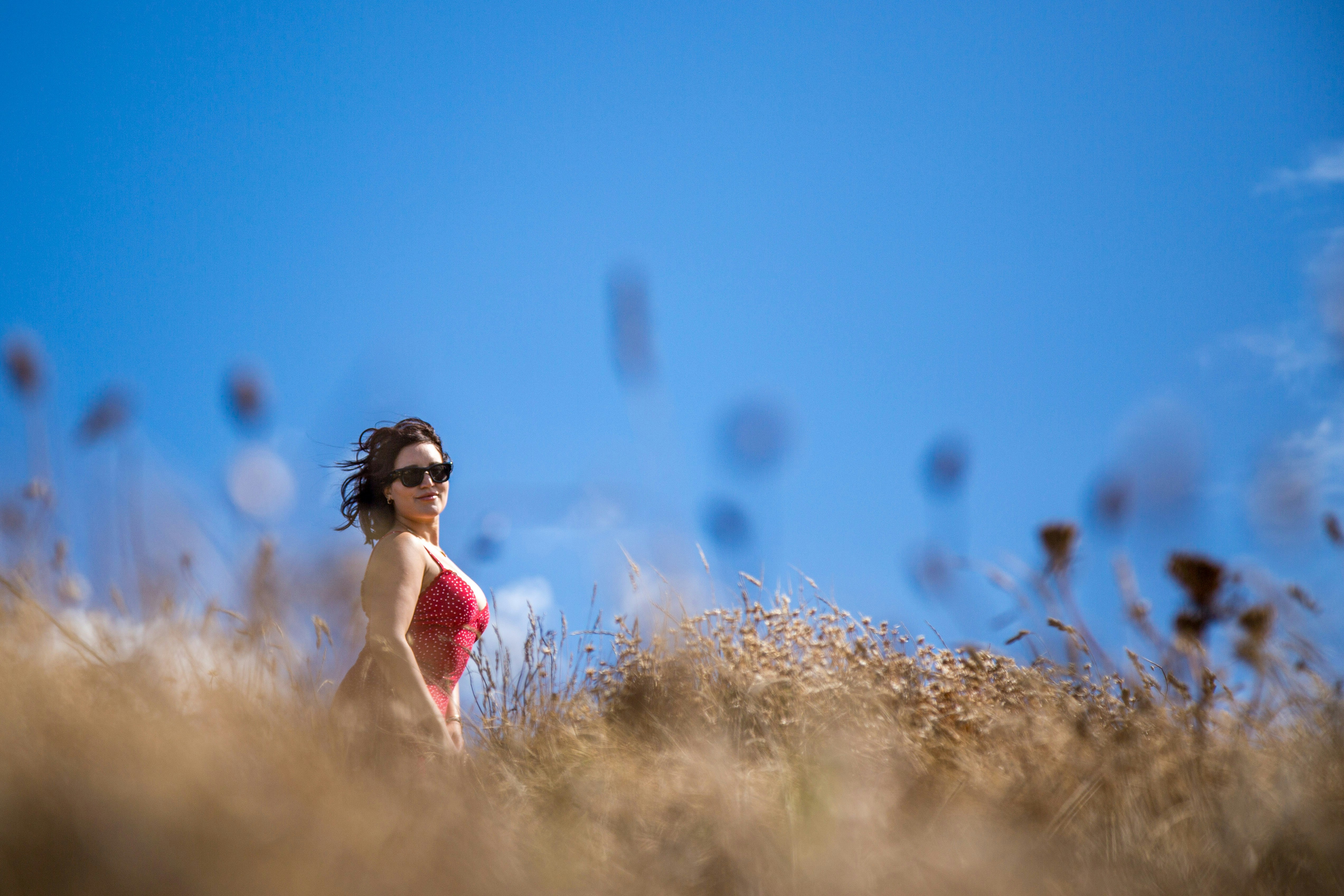 High Prairie Portrait: A Profile in Red Against a Vast Bluest Skies
