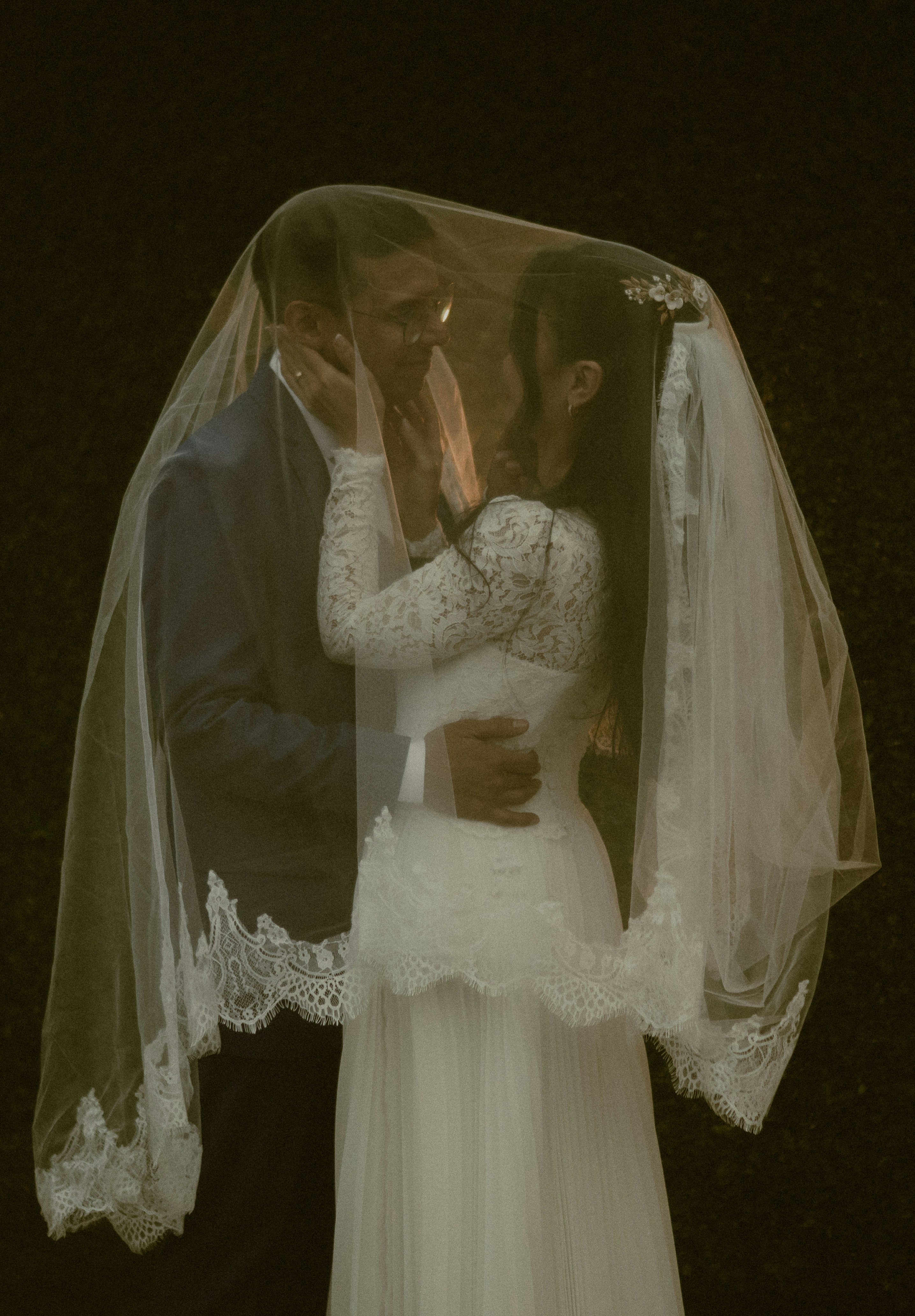 Veiled Vow: A Quiet Embrace Under Lace and Light