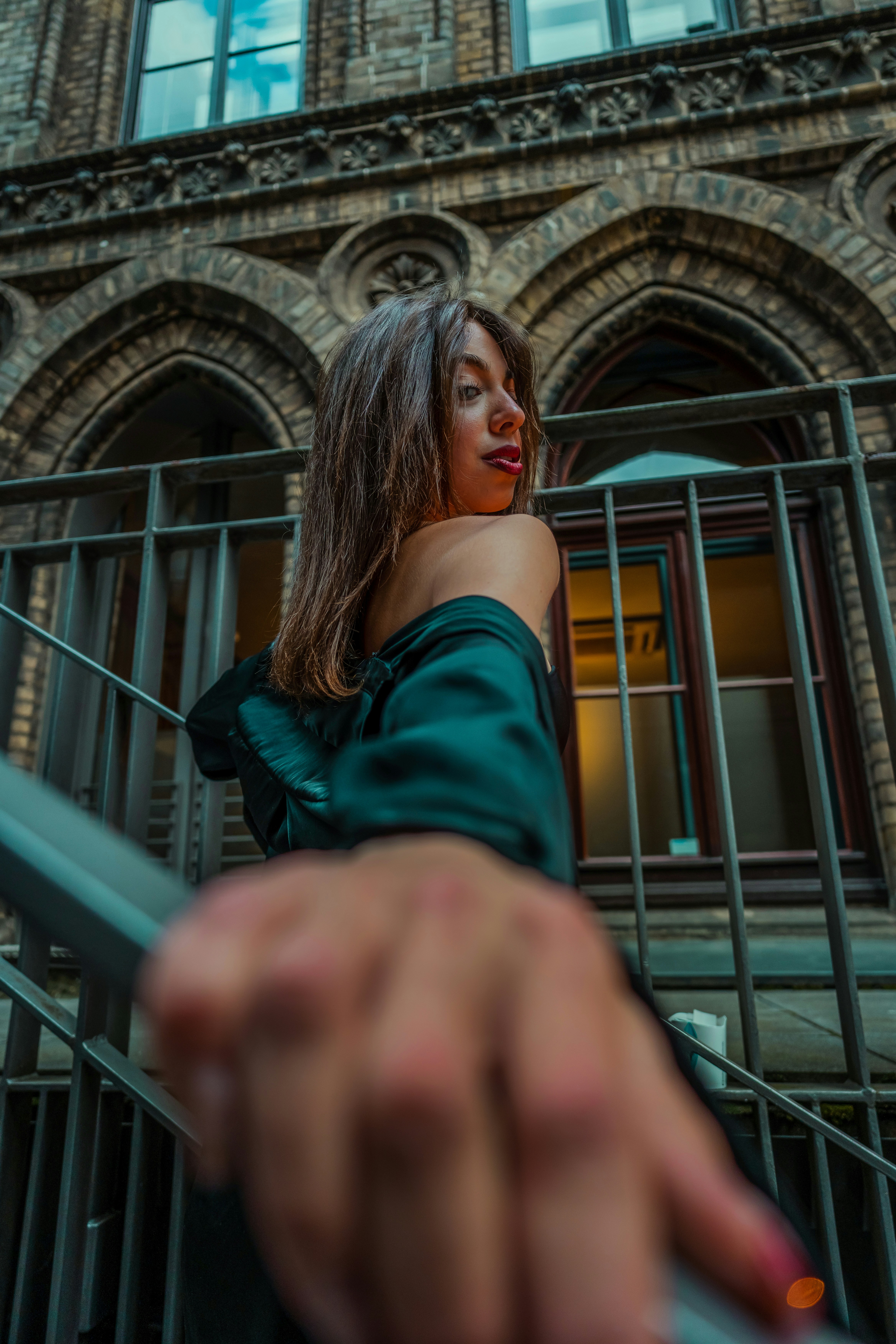 Urban Gaze on Stairs: A Portrait in the City’s Brick Echoes