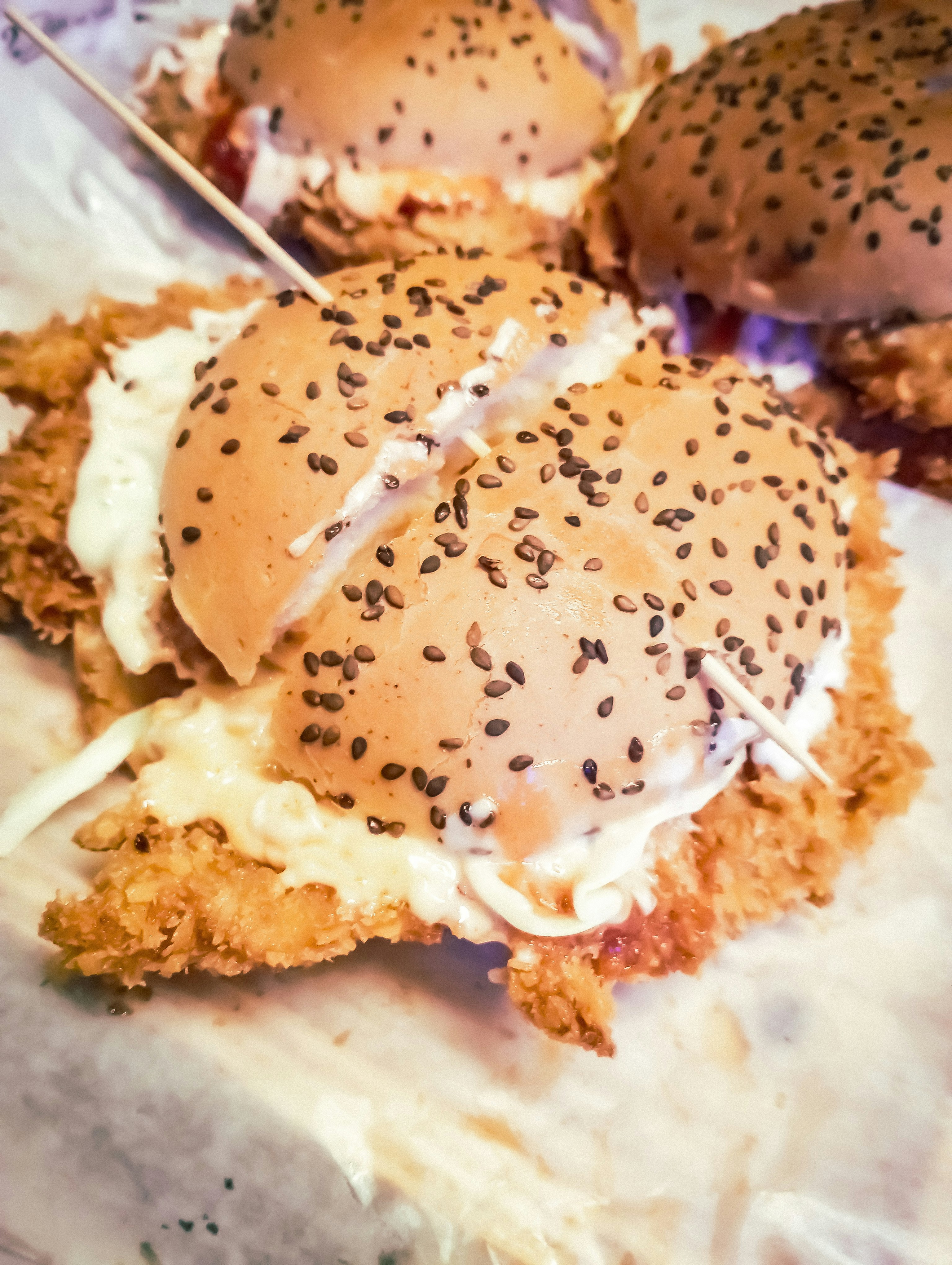 Crunchy Golden Bites: A Trio of Sesame Bun Sliders