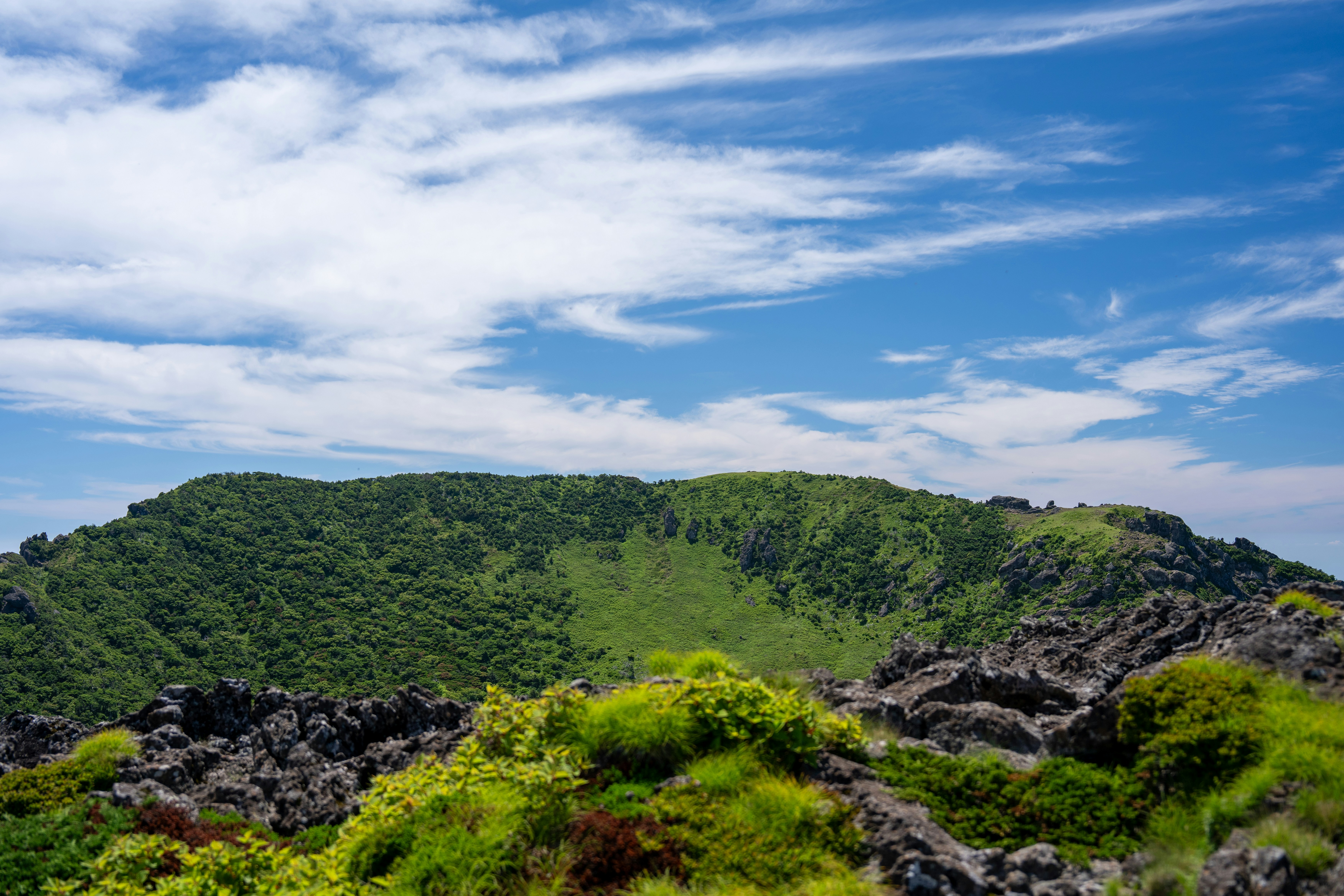 Verdant Ridge Under a Wide Sky